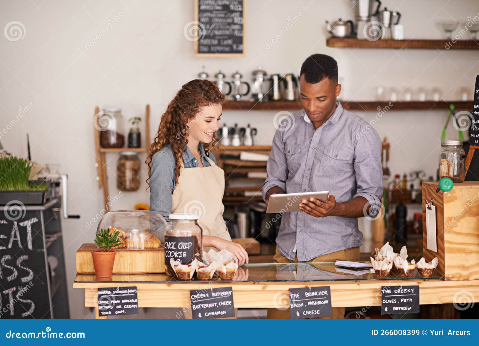 Running the Cafe the Wireless Way. Young Baristas Using a Digital ...