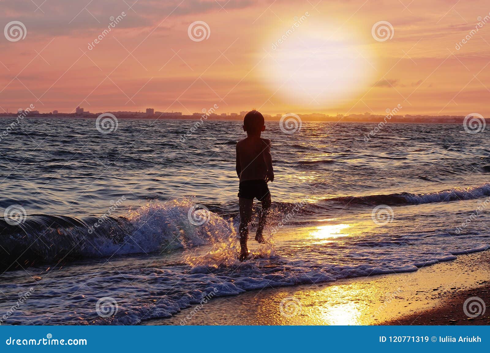 Running Child on the Beach on a Beautiful Red Sunset Stock Image ...
