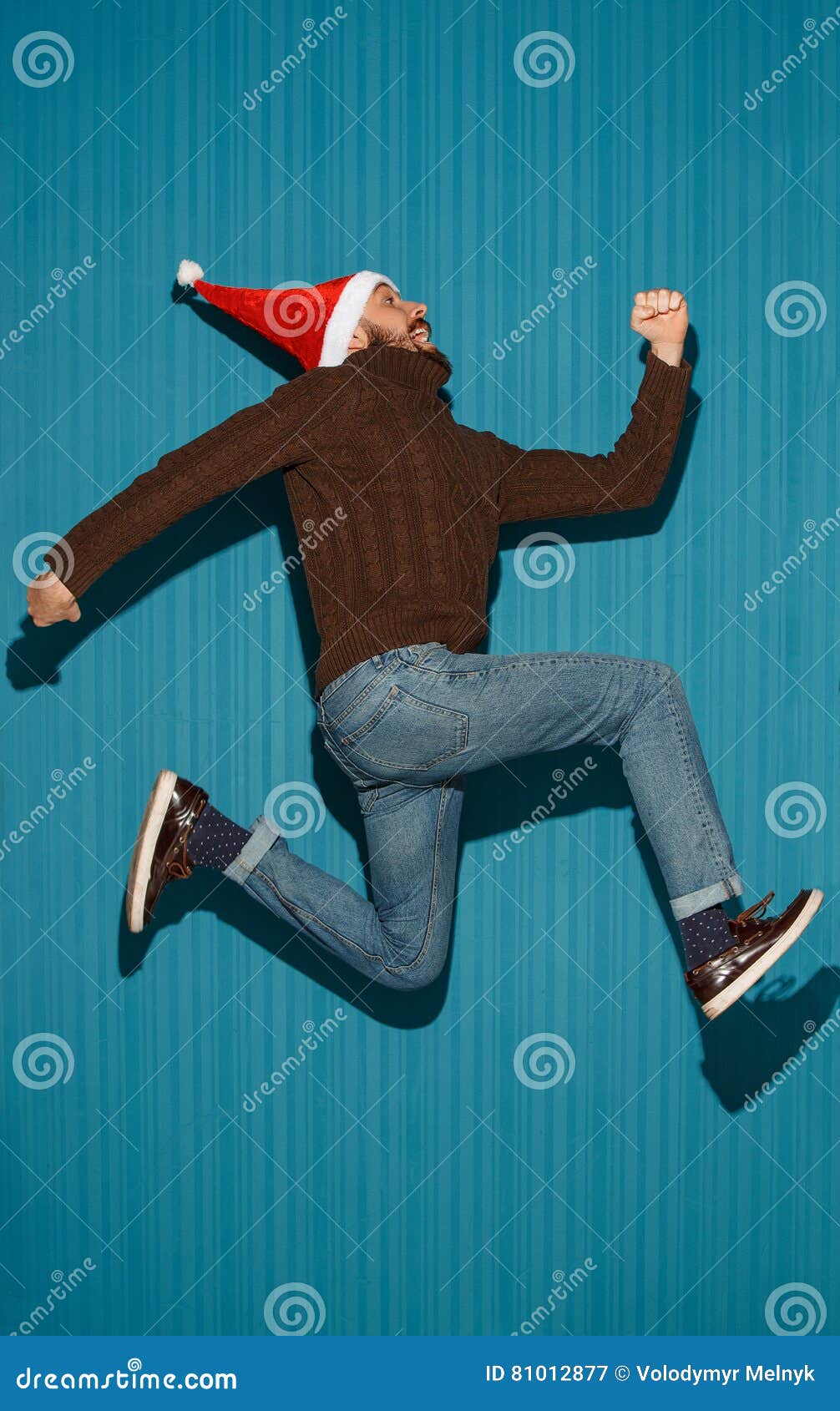 The Running Christmas Man Wearing a Santa Hat Stock Image - Image of ...