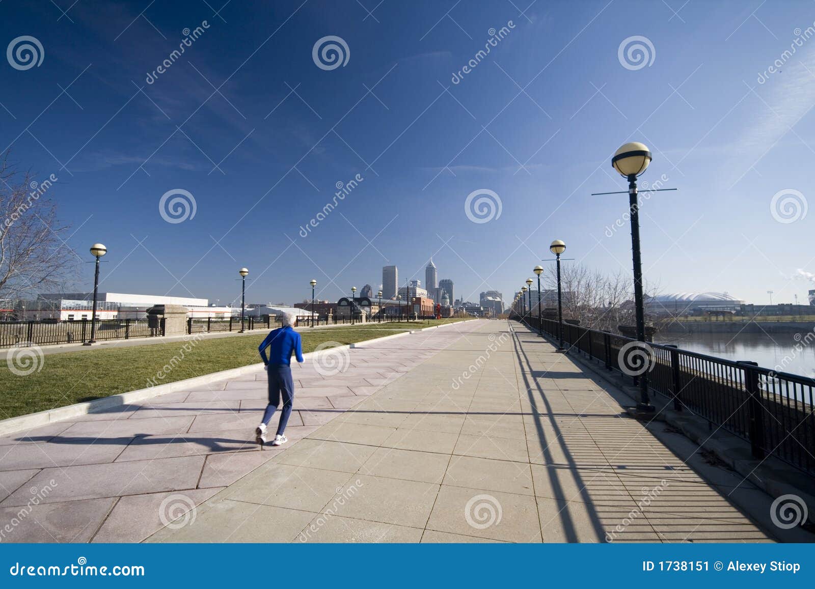 Running in the city stock image. Image of high, shadows - 1738151