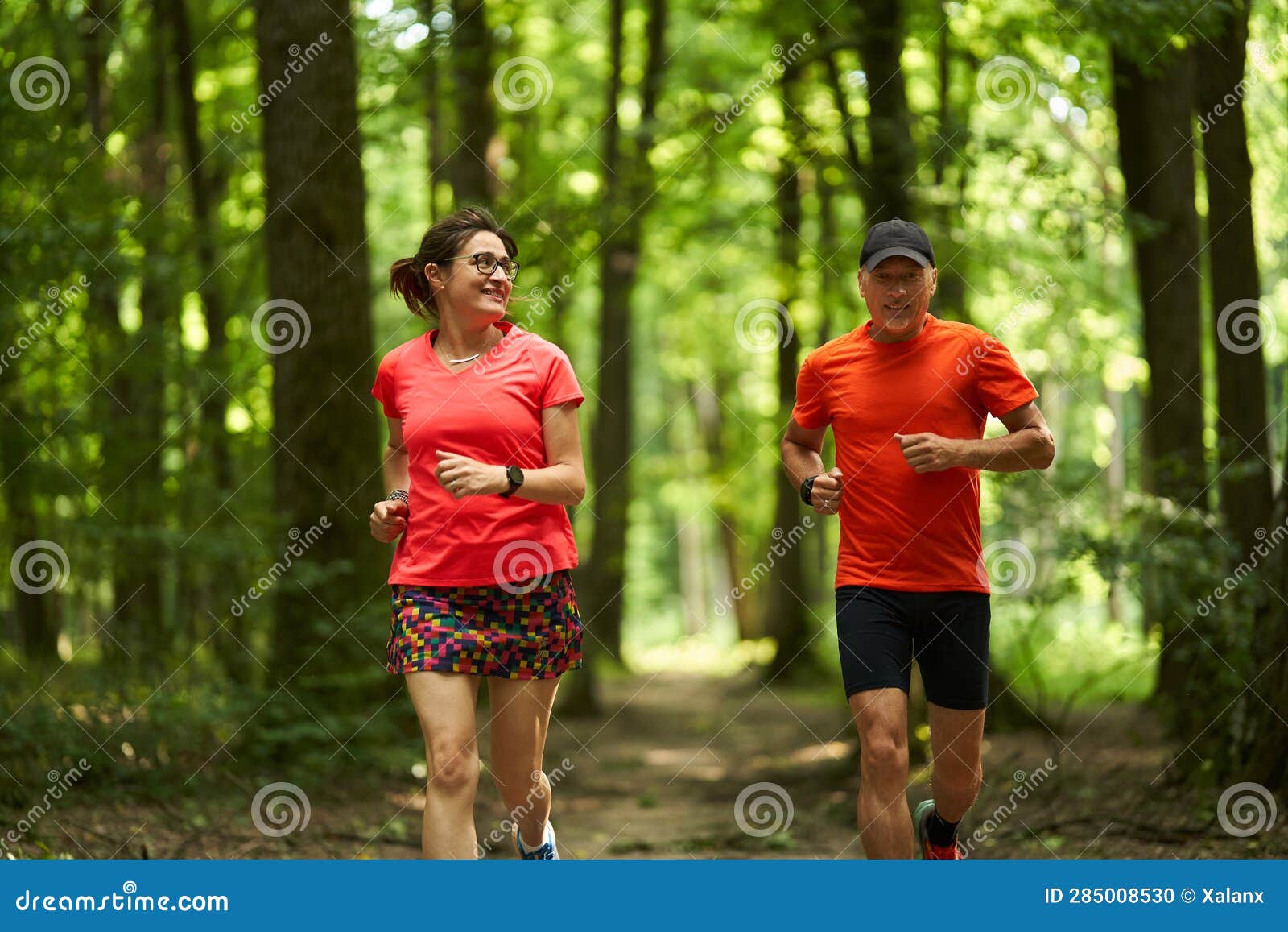 Running Couple in the Forest Stock Photo - Image of workout, happy ...