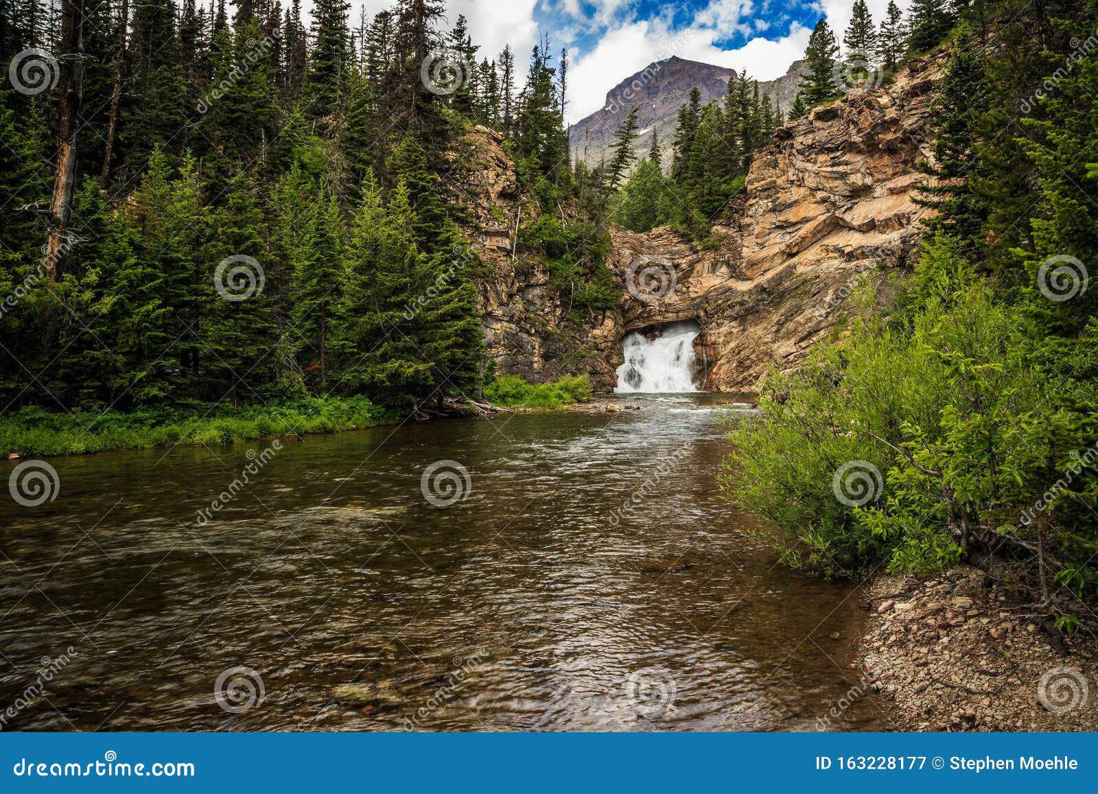 Running Eagle Falls in Glacier National Park Stock Image - Image of ...