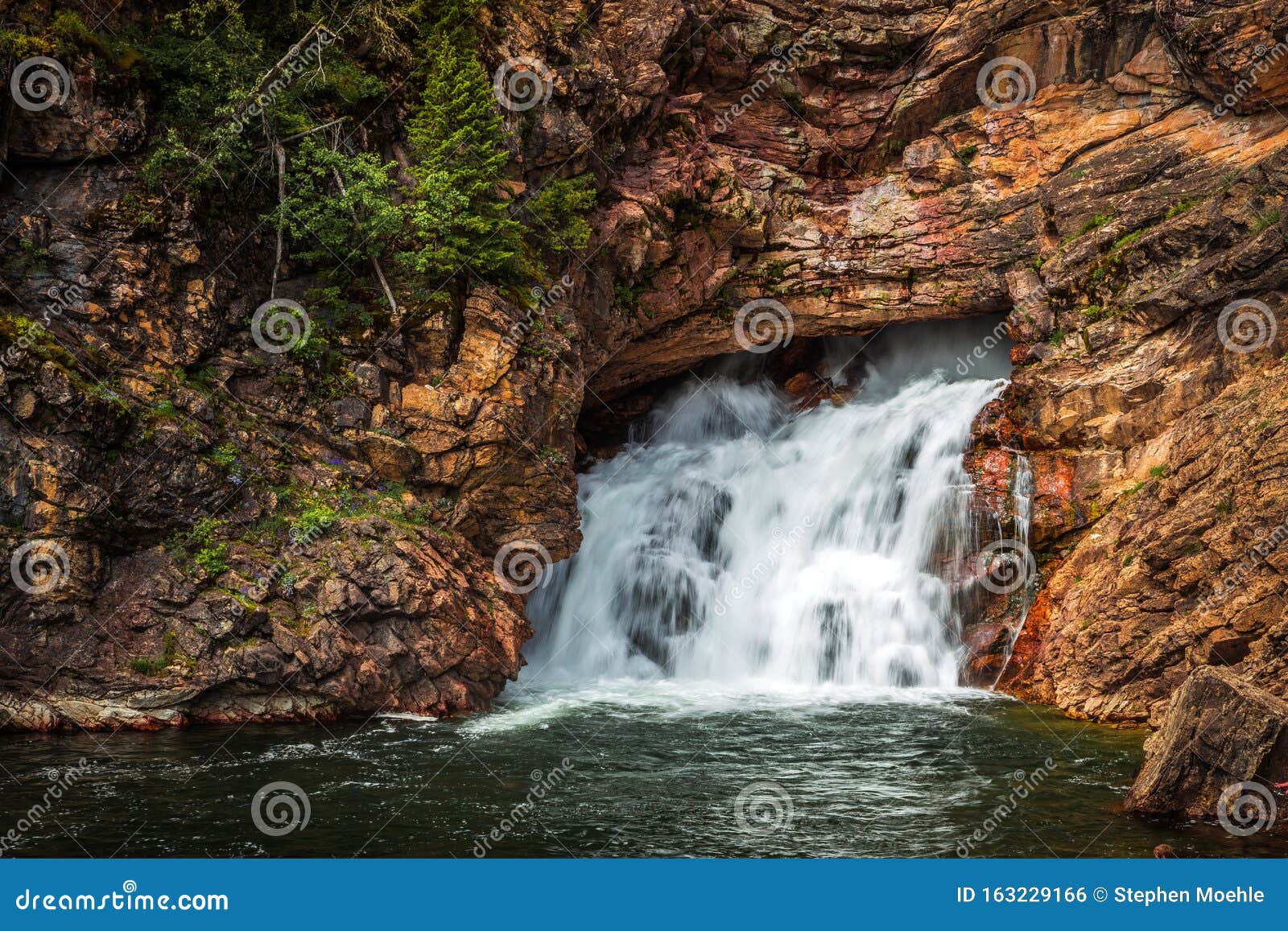 Running Eagle Falls in Glacier National Park Stock Photo - Image of ...
