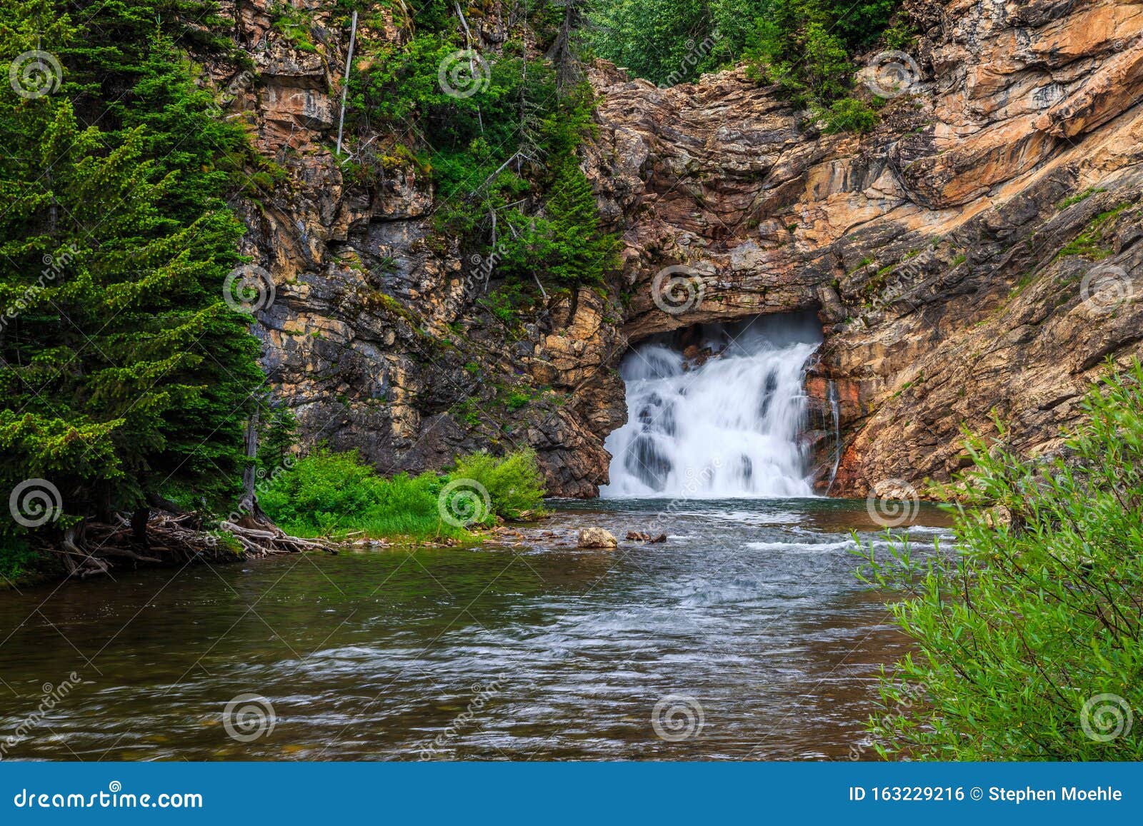 Running Eagle Falls in Glacier National Park Stock Photo - Image of ...