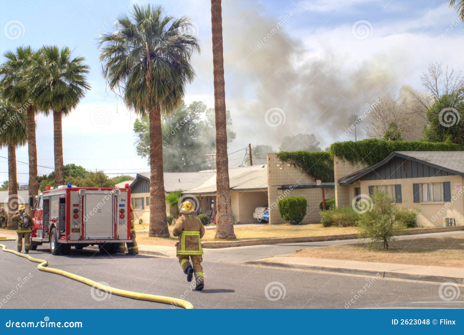 Running Fire Fighters Laying a Line Stock Photo - Image of outdoor ...