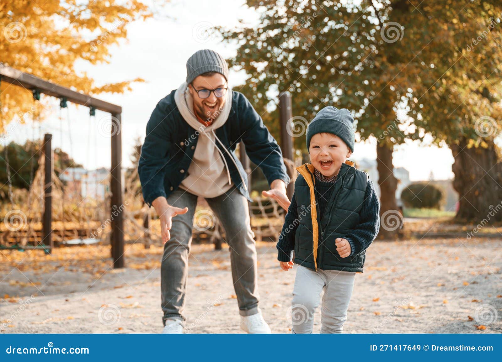 Running, Having Fun. Father and Young Son is Together Outdoors at ...