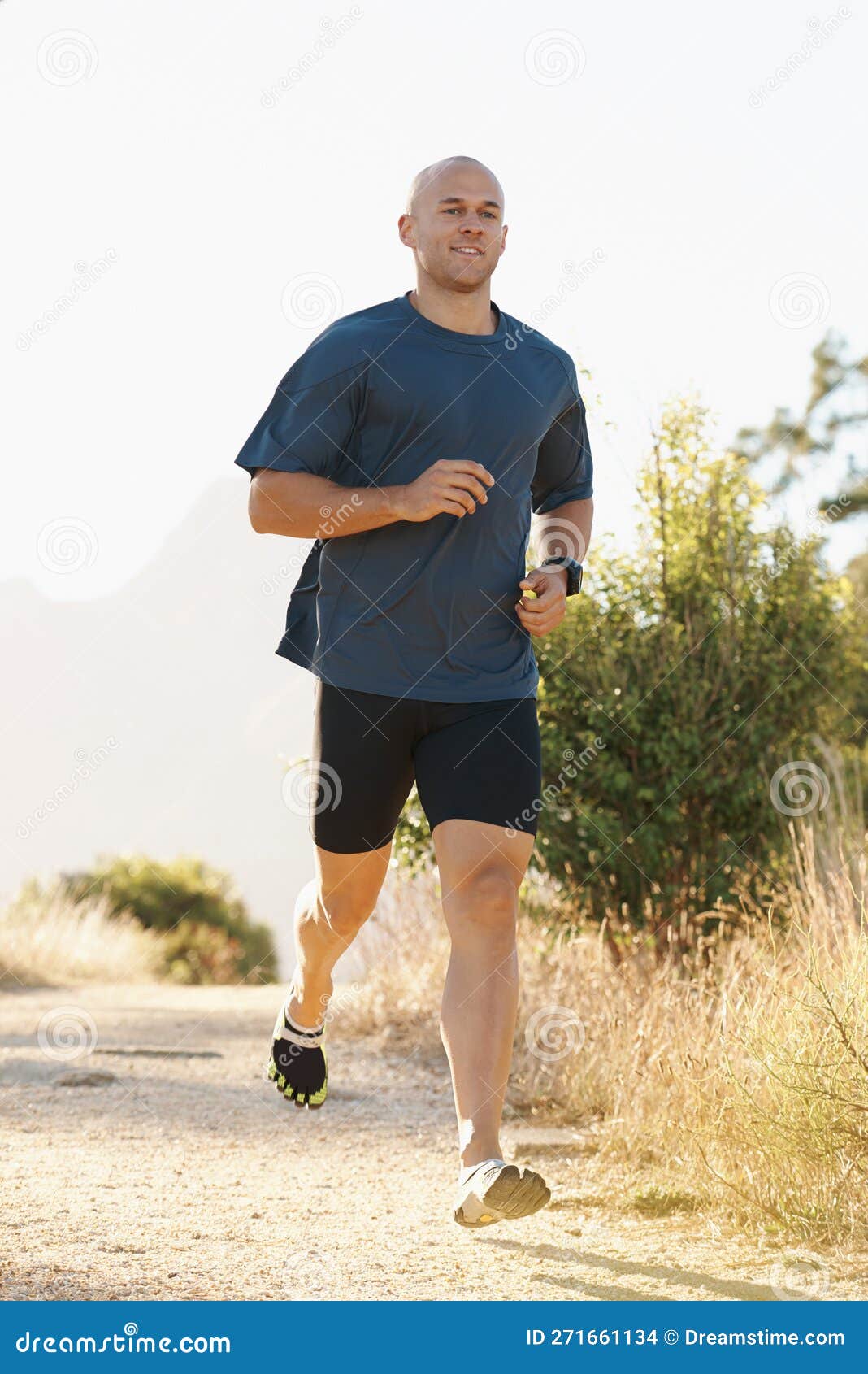 Running is His Favorite Form of Exercise. a Young Runner Training ...