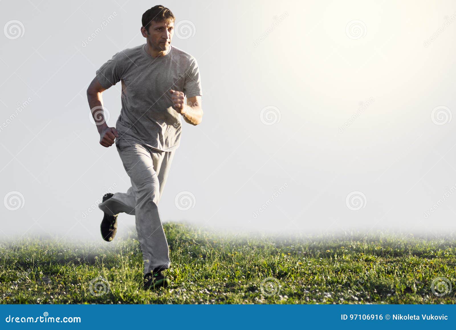 Running jogging man stock photo. Image of grass, activity - 97106916