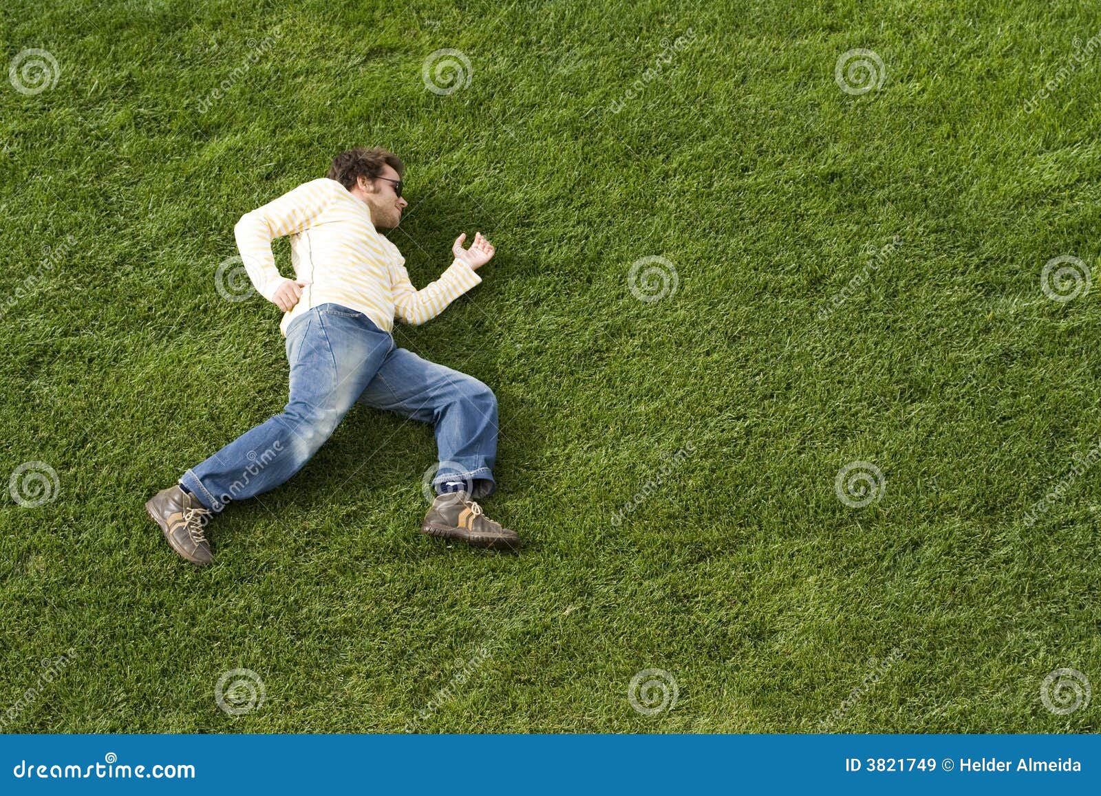Running Laying Down on the Grass Stock Image - Image of fashion, energy ...