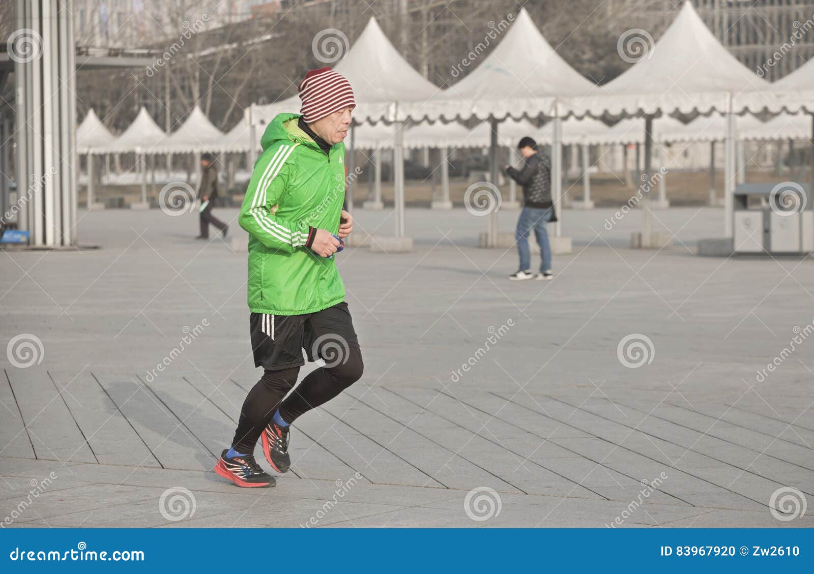 A running man editorial image. Image of attractively - 83967920