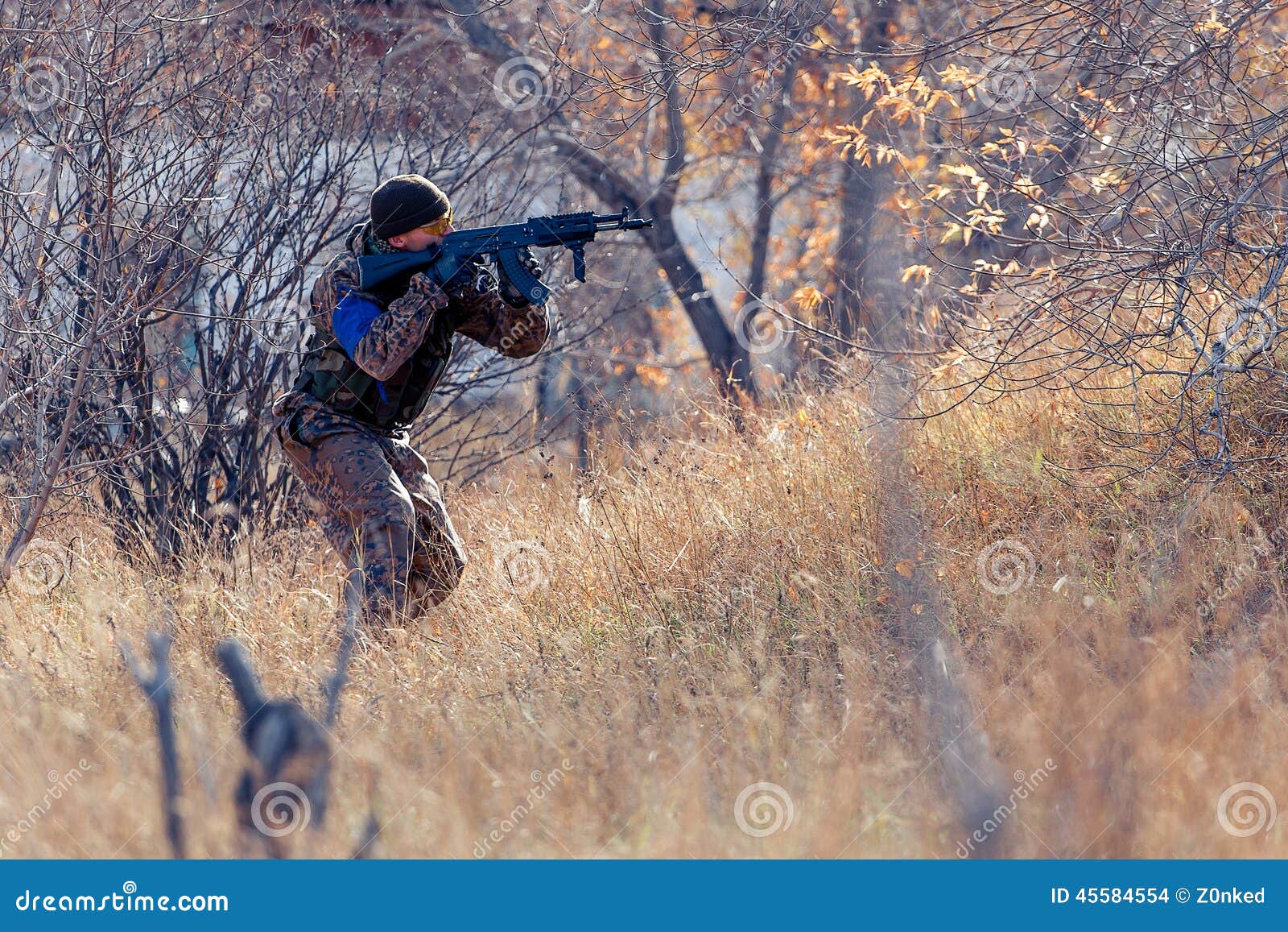 Running man with a gun editorial stock image. Image of tournament ...