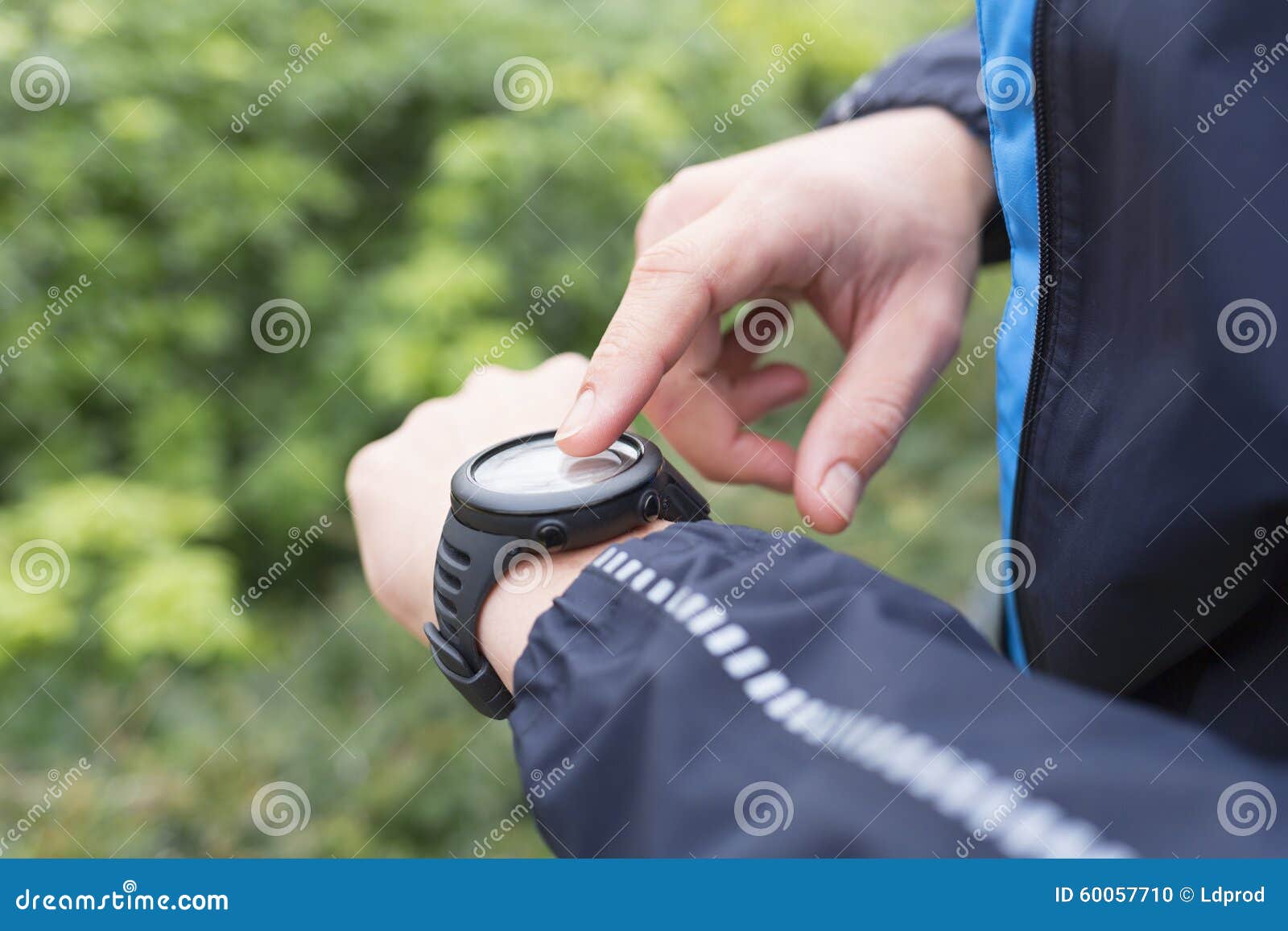 Running Man Looking at Smartwatch. Close-up Hands Stock Photo - Image ...