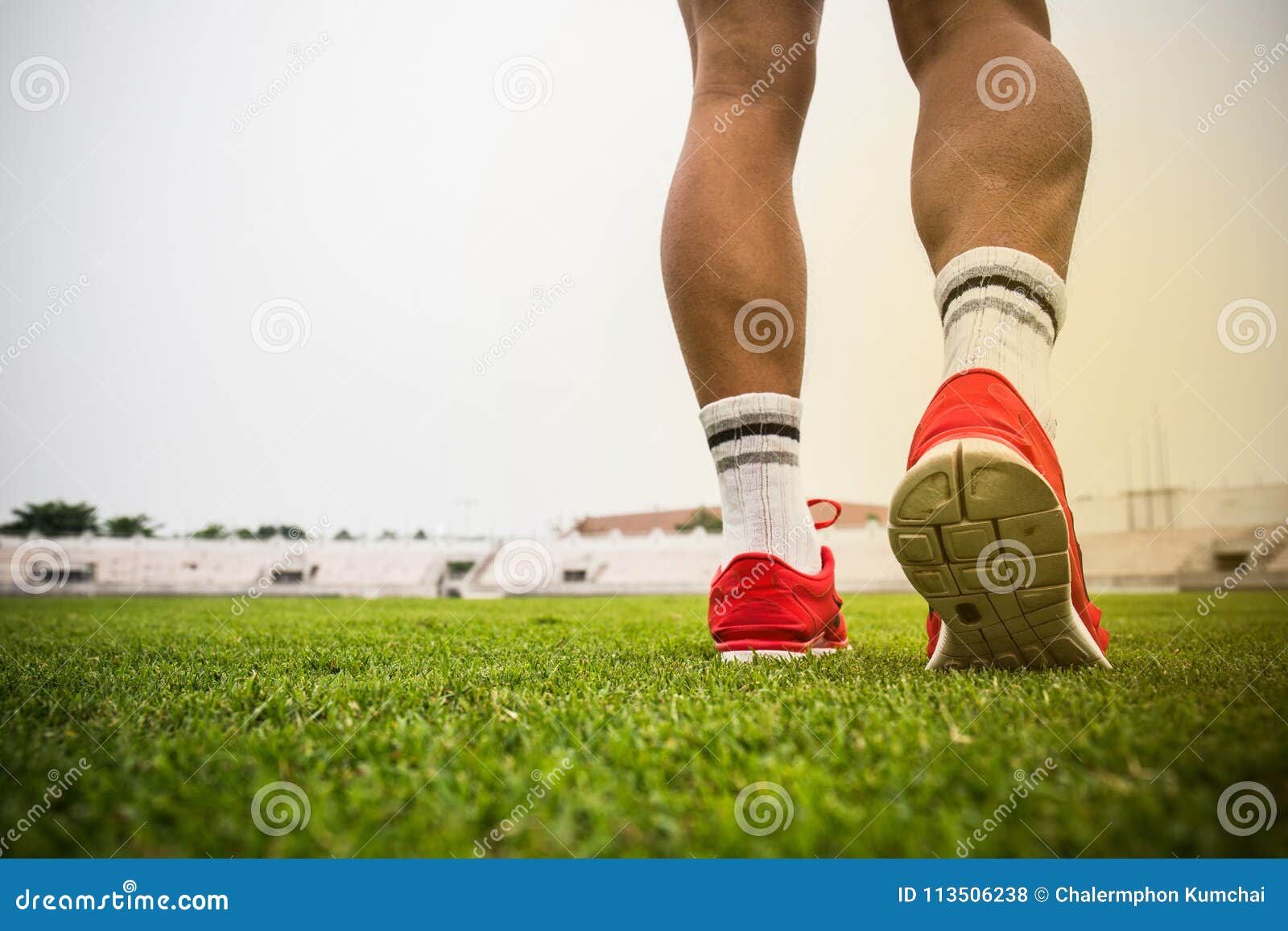 Running Man Runner Jogging on Grass Stock Photo - Image of shoes ...