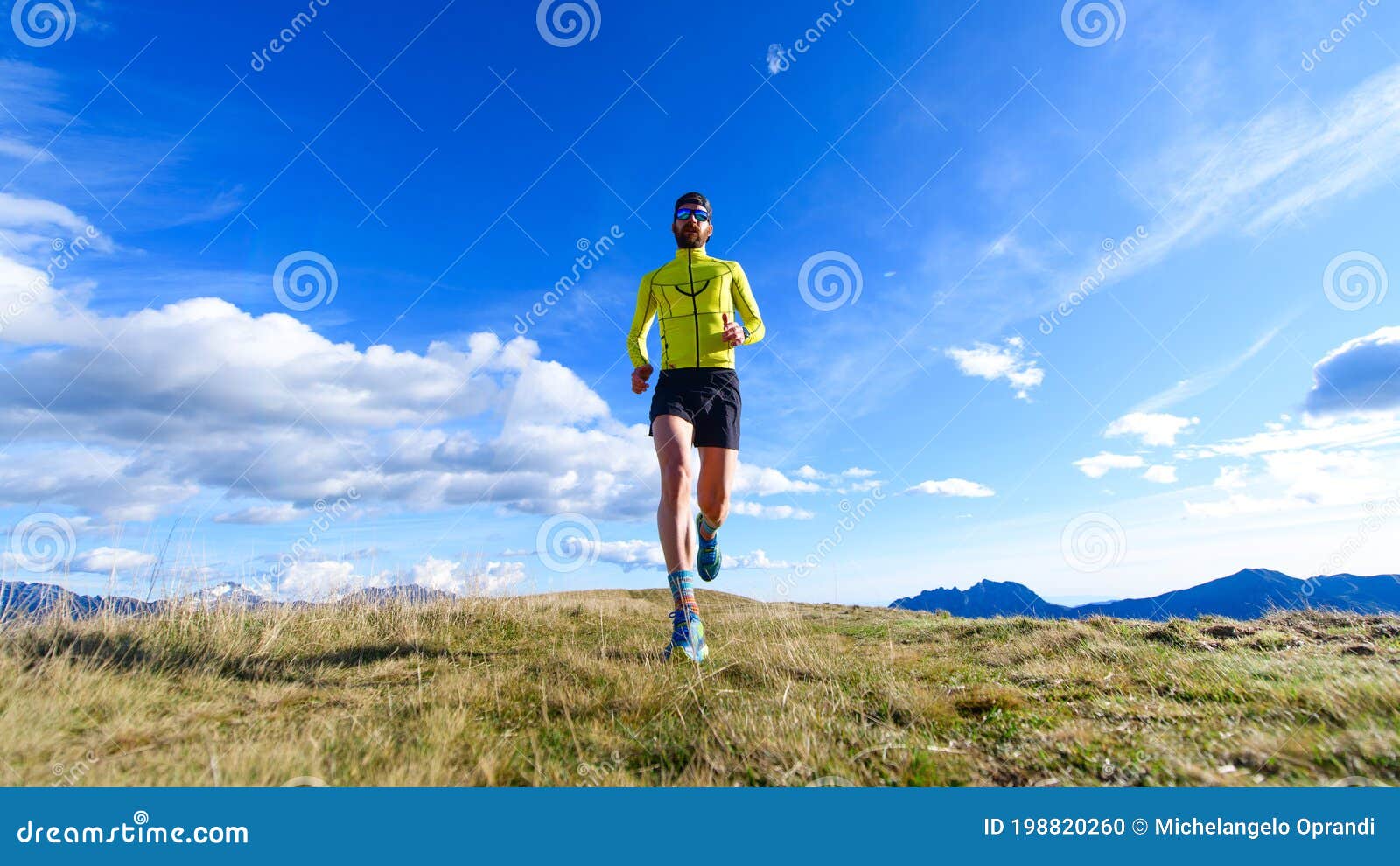 Running in the mountains stock photo. Image of nordic - 198820260