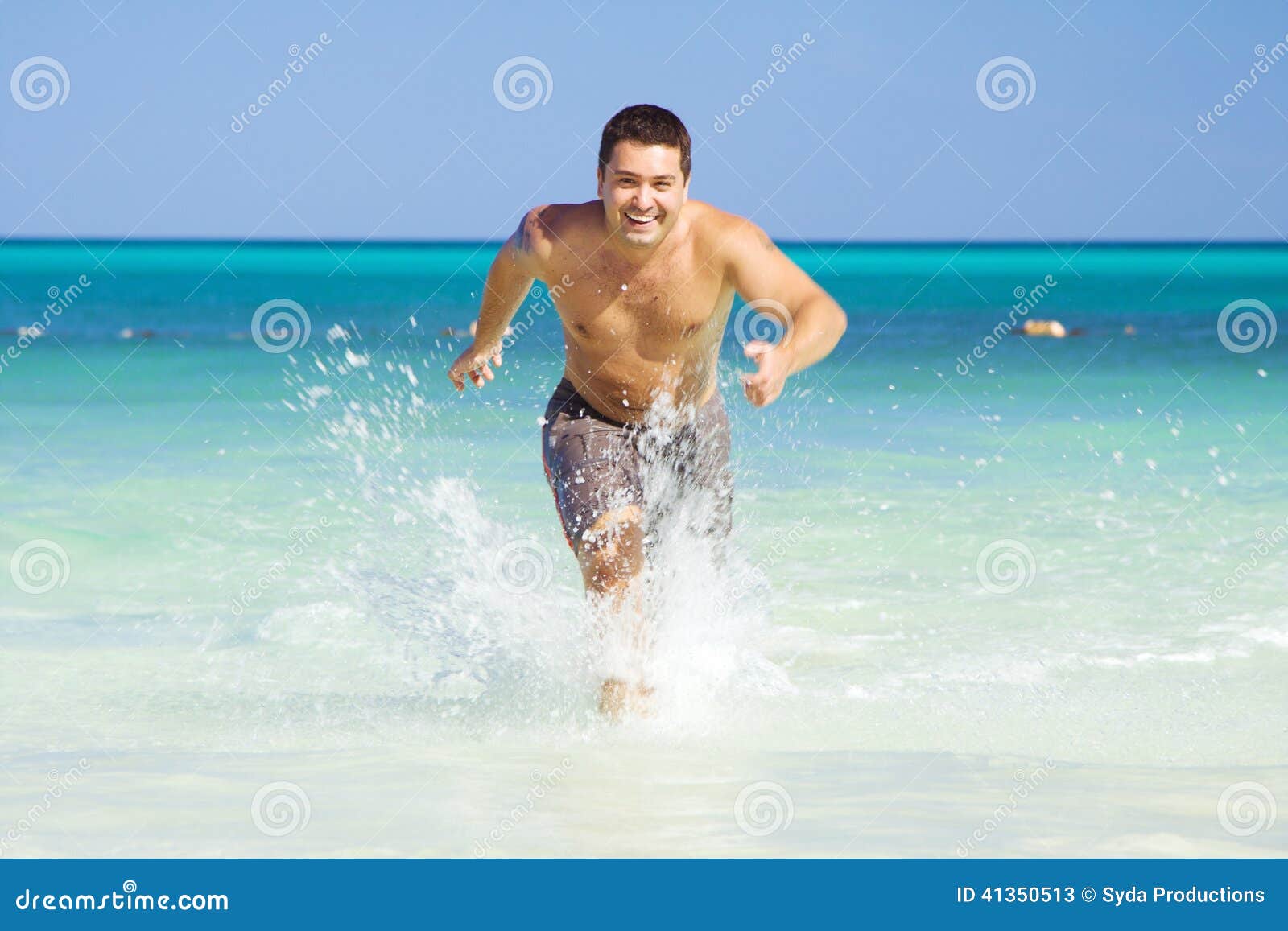 Running out of the ocean stock image. Image of active - 41350513