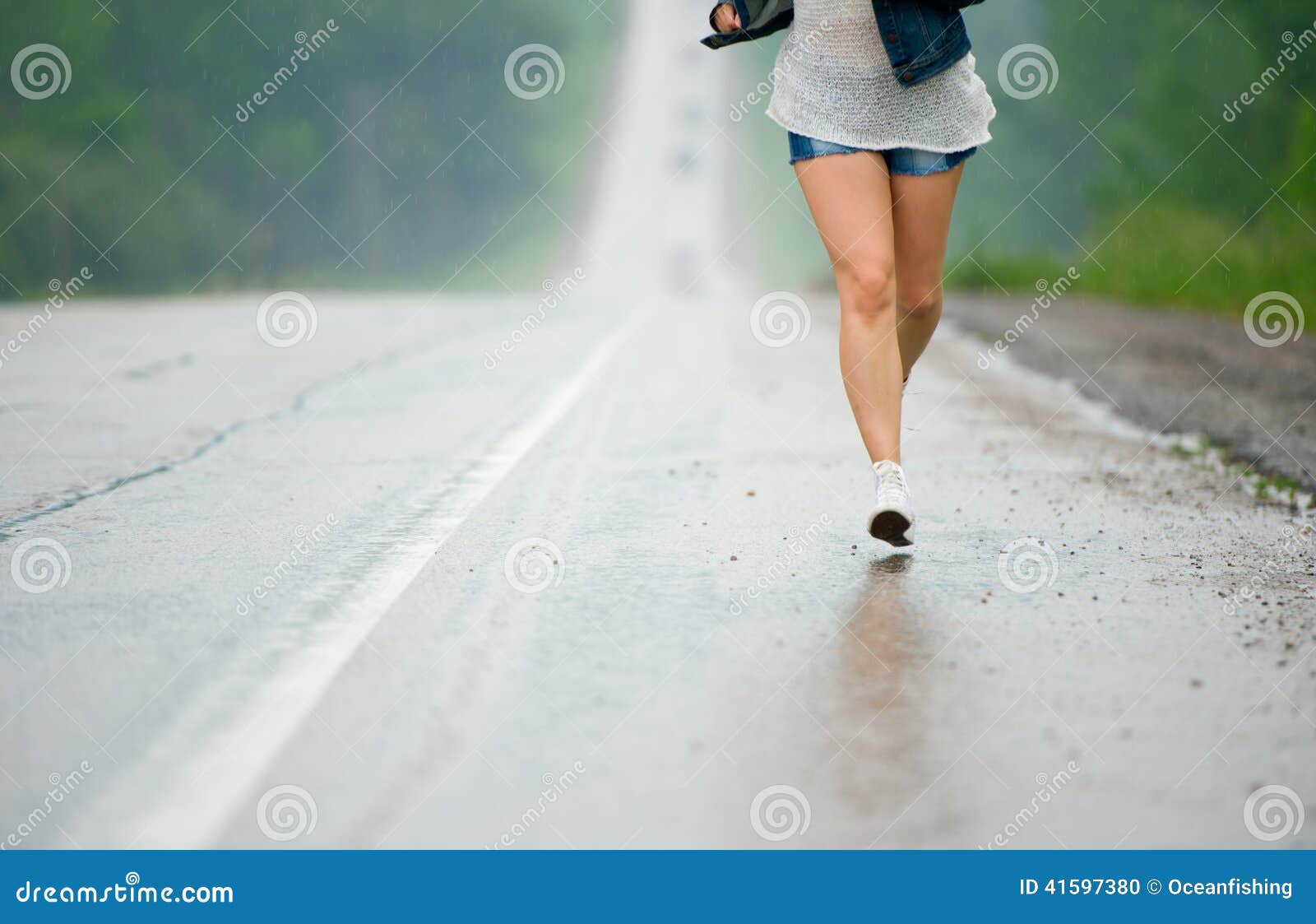 Running in the rain stock photo. Image of adult, person - 41597380