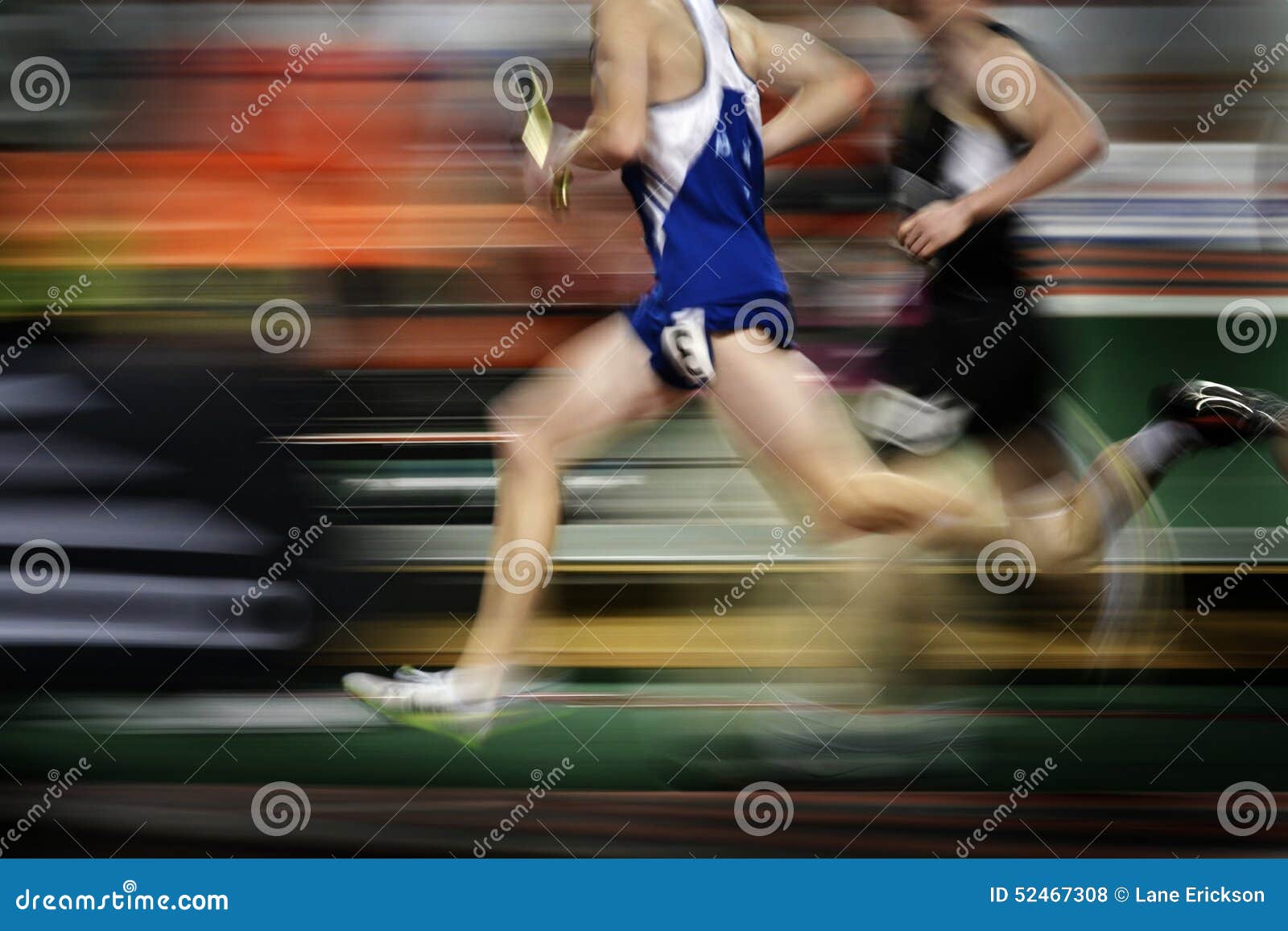 Running a Relay Race on Tract Holding Baton Stock Photo - Image of ...