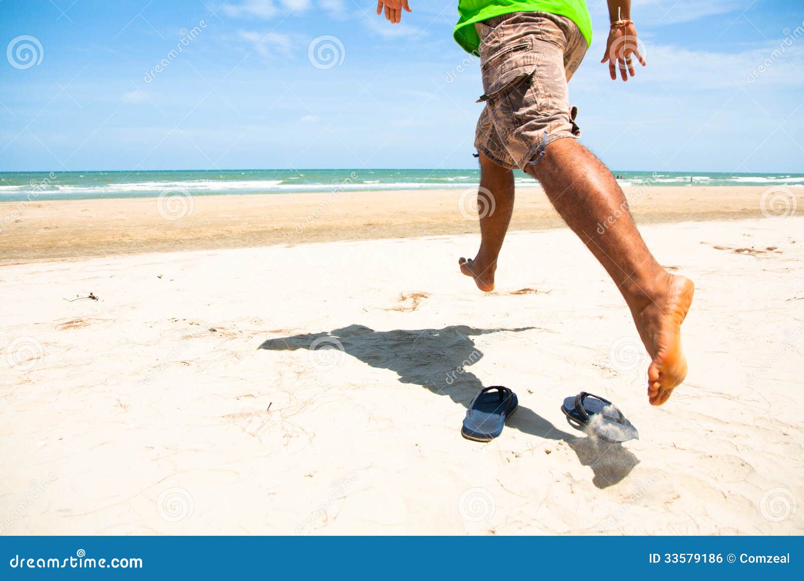 Running into the sea stock photo. Image of vitality, coast - 33579186