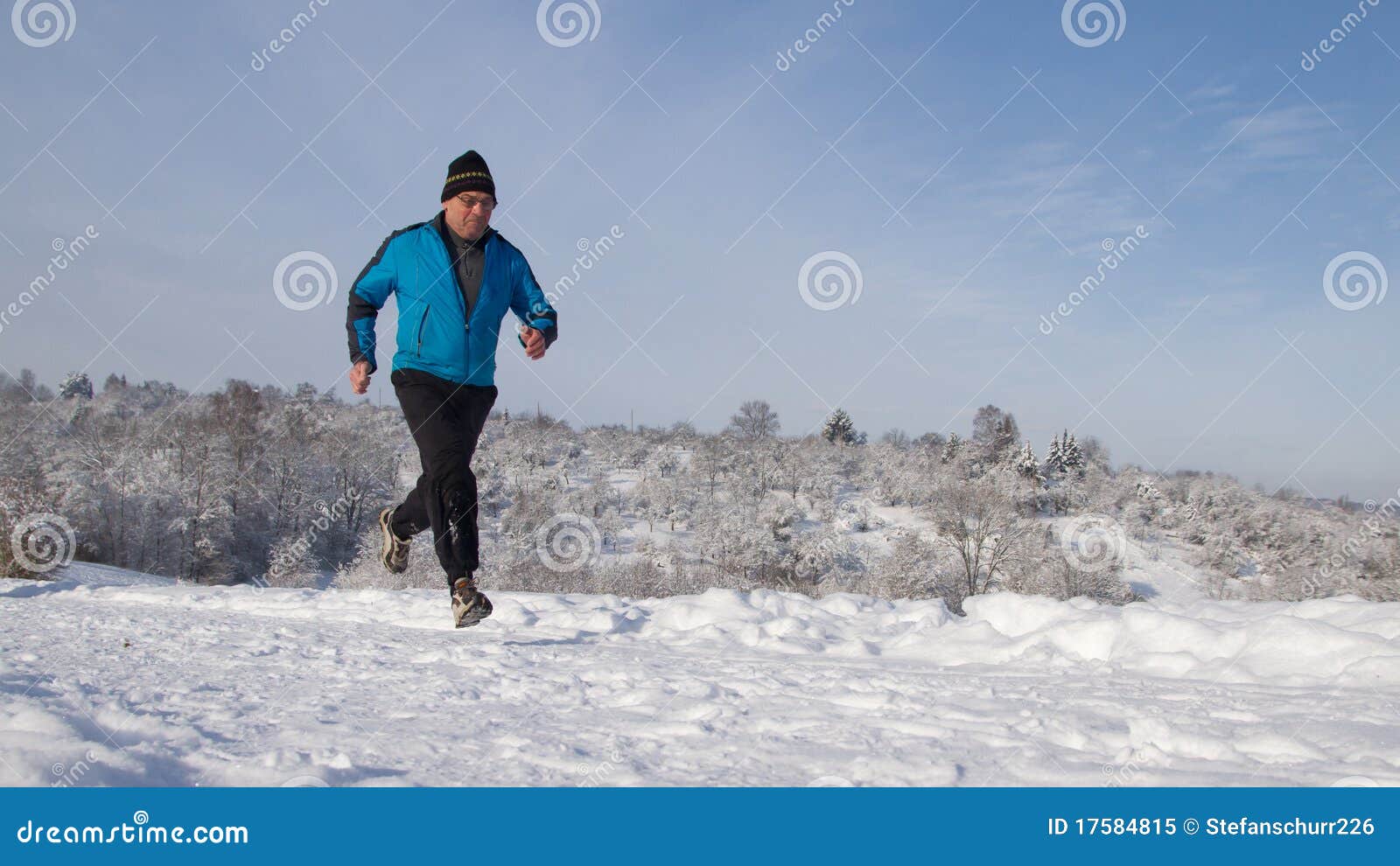Running senior in the snow stock image. Image of sport - 17584815