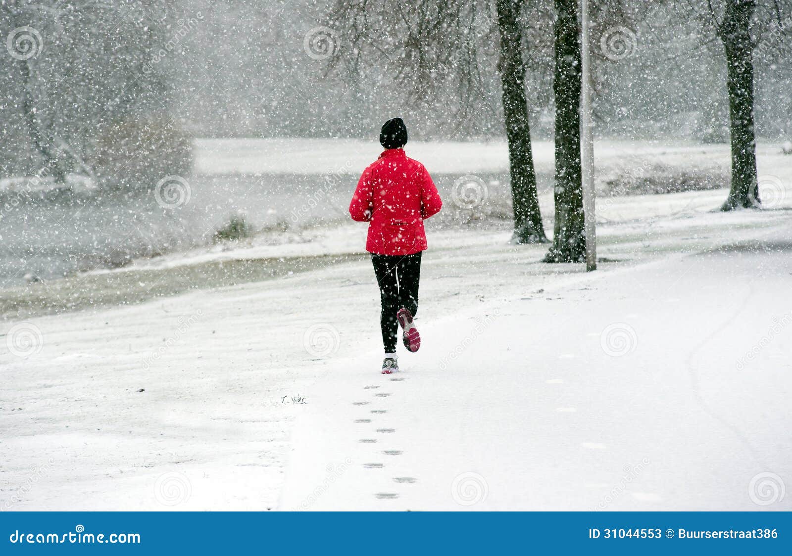 Running in snow stock image. Image of activity, action - 31044553
