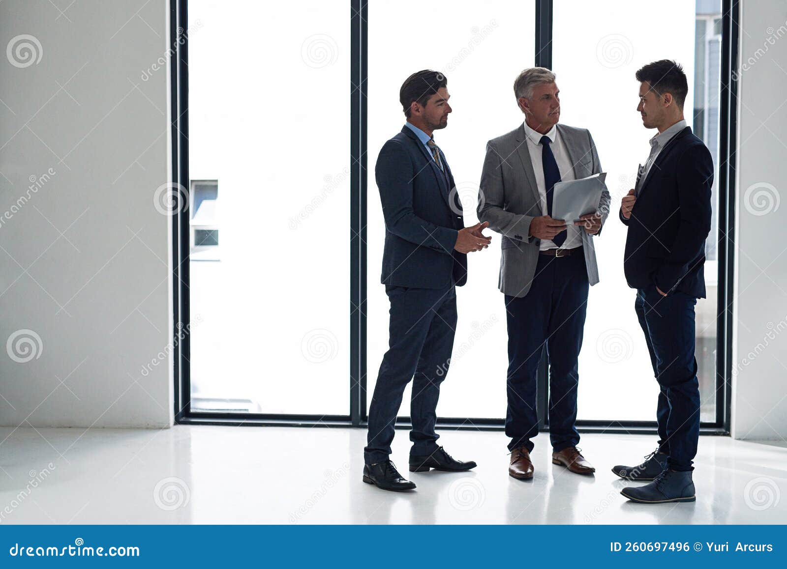 Running through Some Quick Updates Together. a Group of Businessmen ...