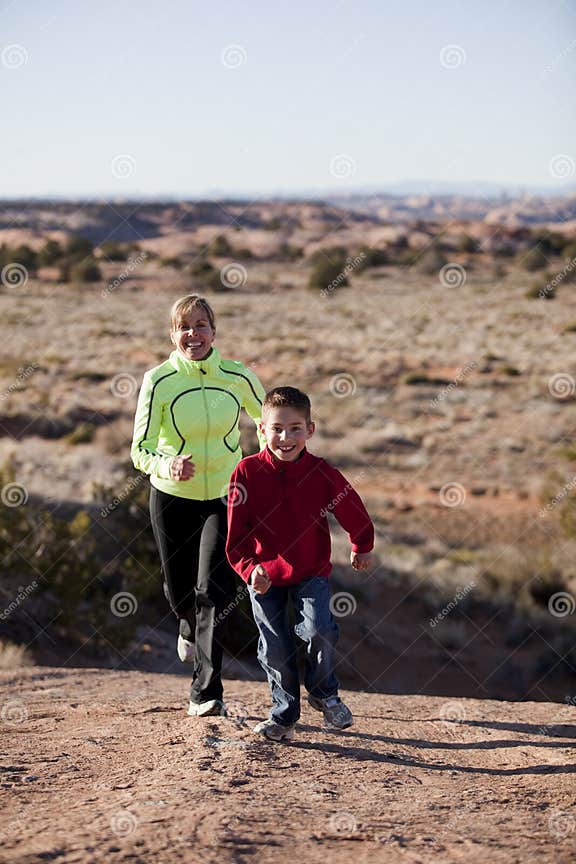 Running after son stock photo. Image of fitness, hiking - 13979726