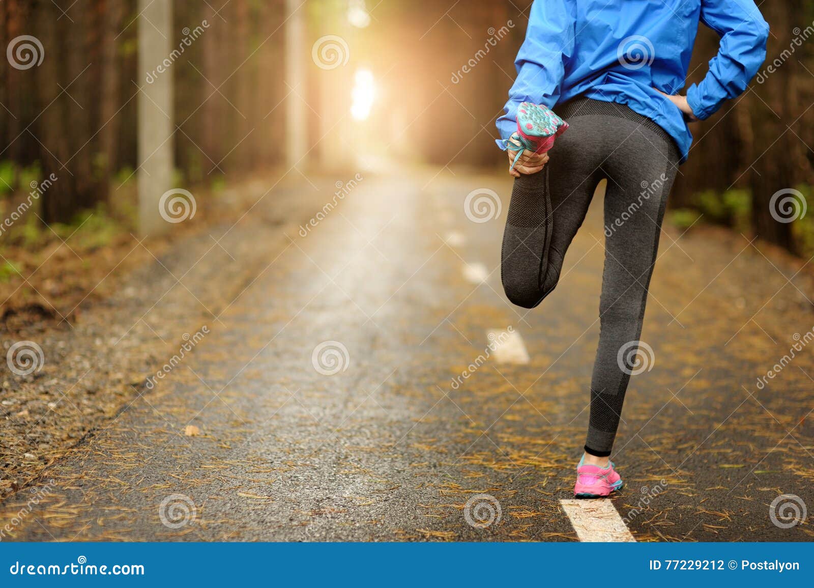 Running Stretching Runner Doing Warm-up before the Marathon. Stock ...