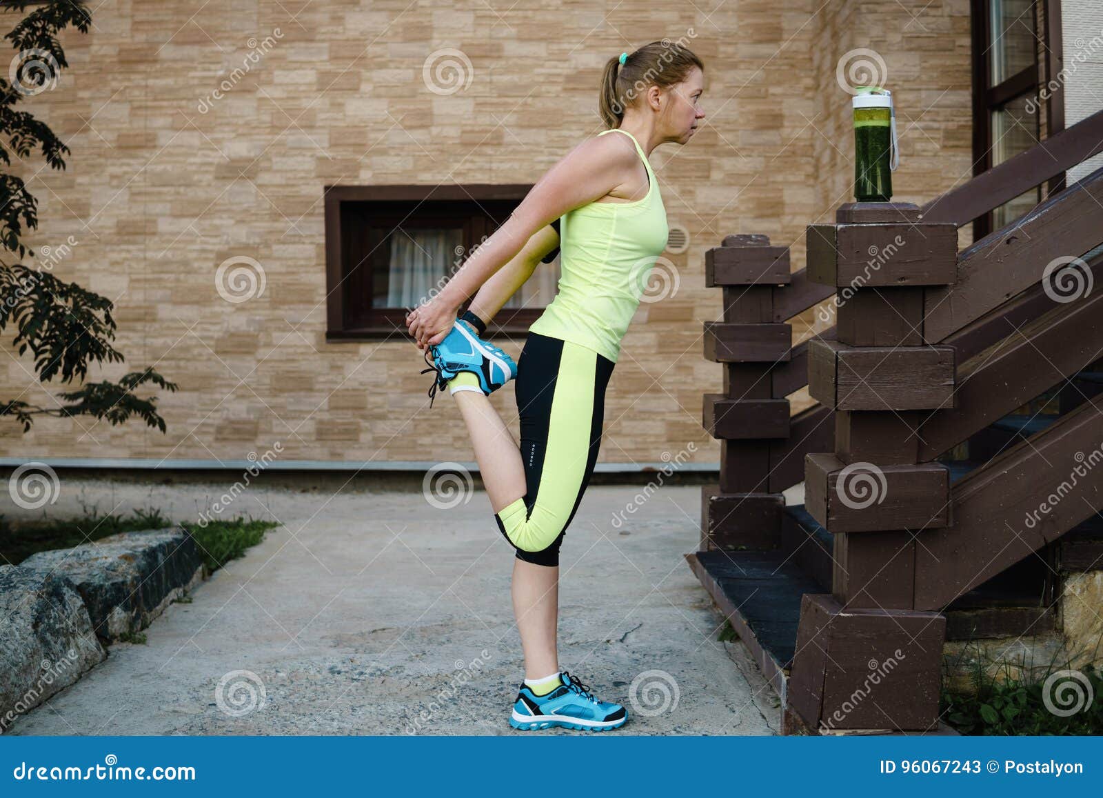 Running Stretching Runner Doing Warm-up before the Marathon. Stock ...