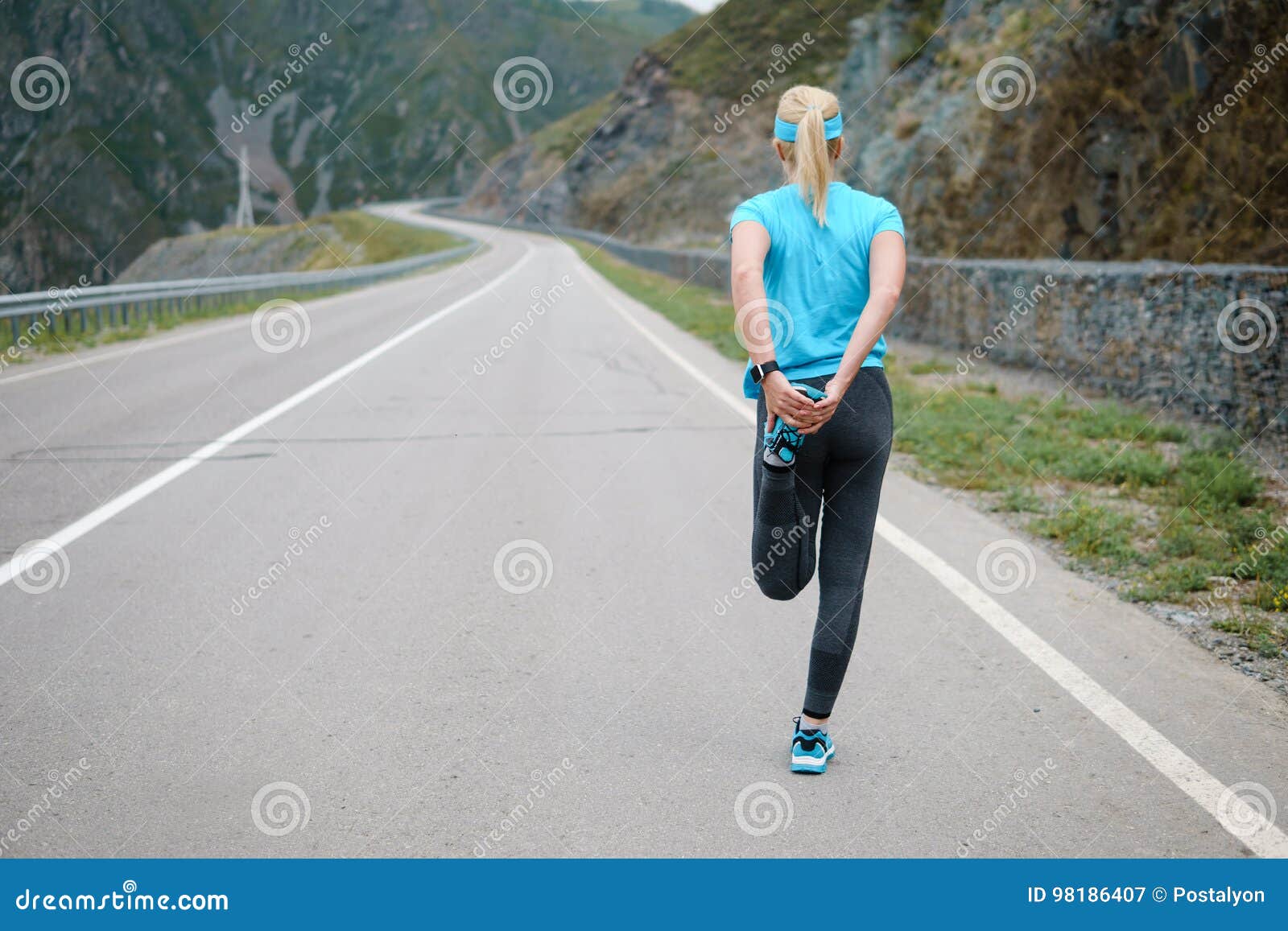 Running Stretching Runner Doing Warm-up before the Marathon. Stock ...