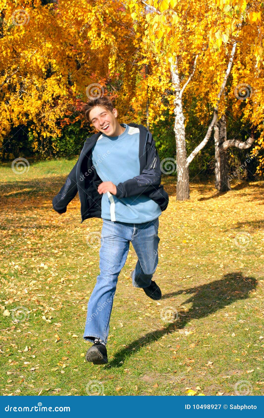 Running teenager stock image. Image of cute, jeans, expressing - 10498927
