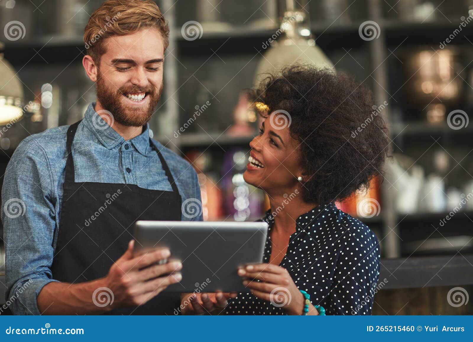 Running Their Cafe on the Wireless Network. Young Coffee Shop Workers ...