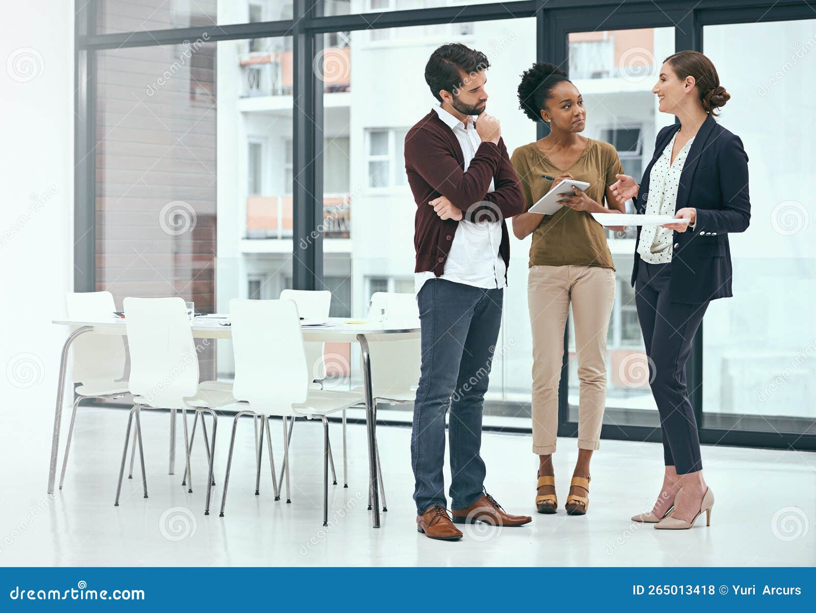 Running through Their Tasks for the Day. a Group of Colleagues Having a ...