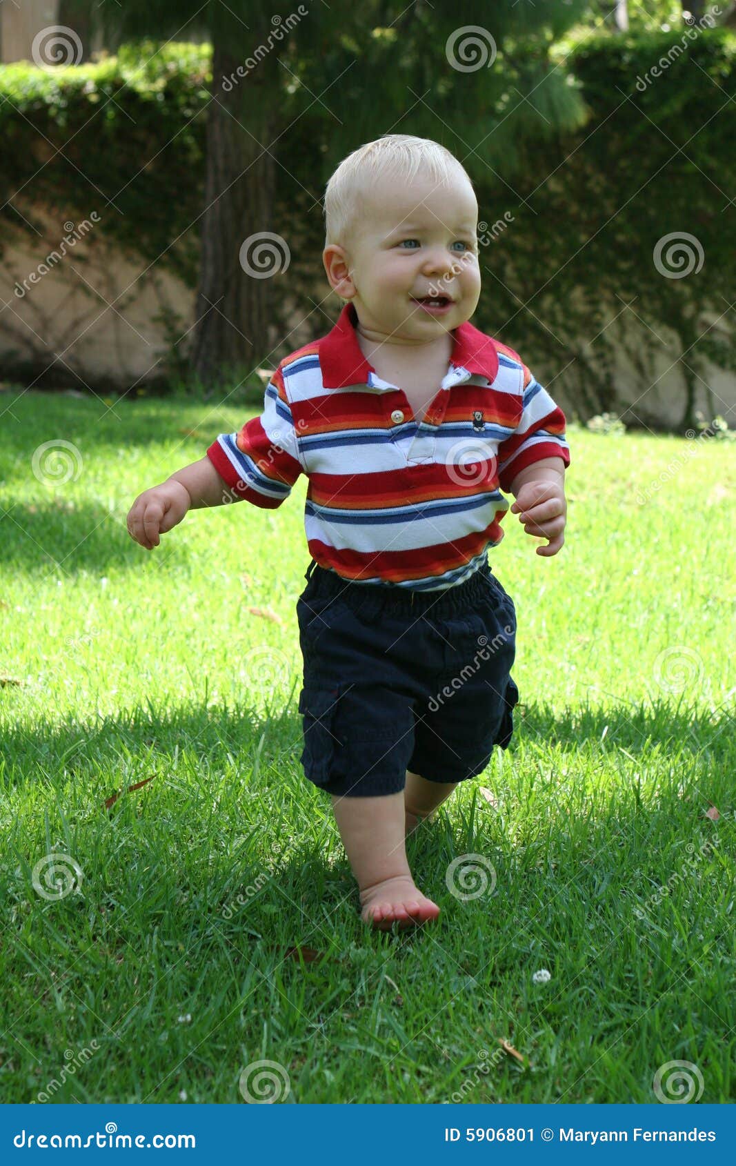 Running Toddler on Grass stock image. Image of blond, smiling - 5906801