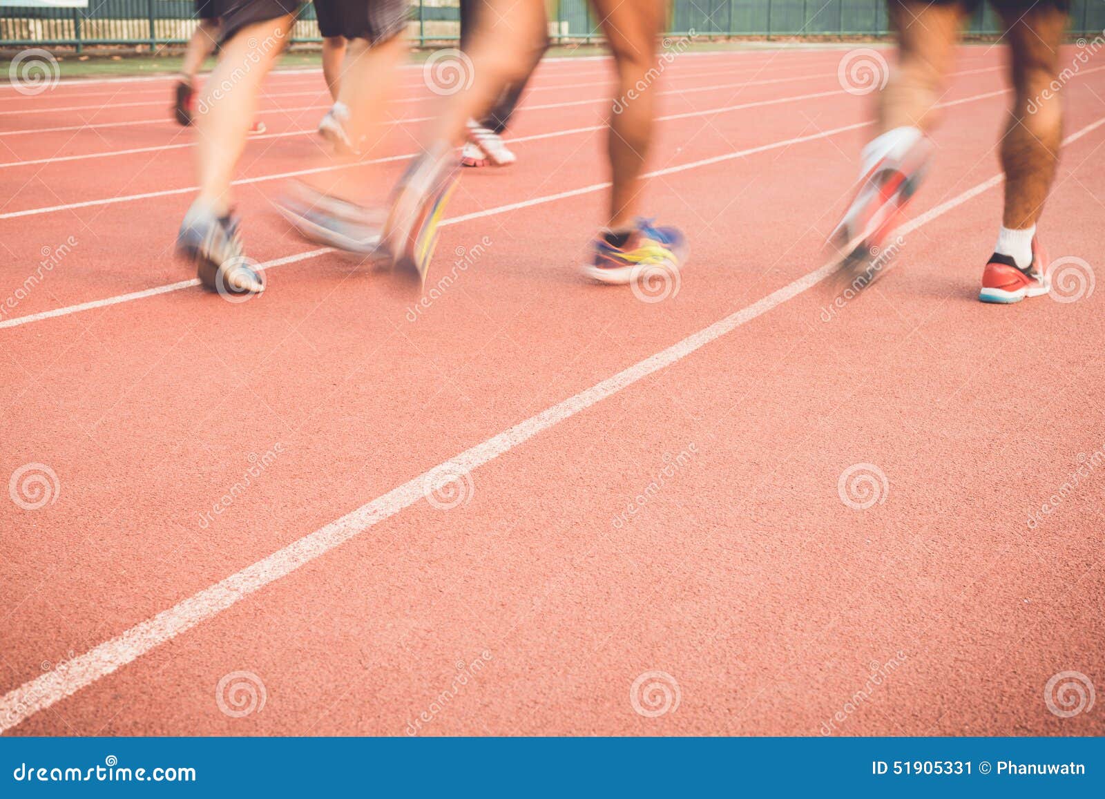 Running Track with Blur of Runner Feet in Stadium Stock Image - Image ...