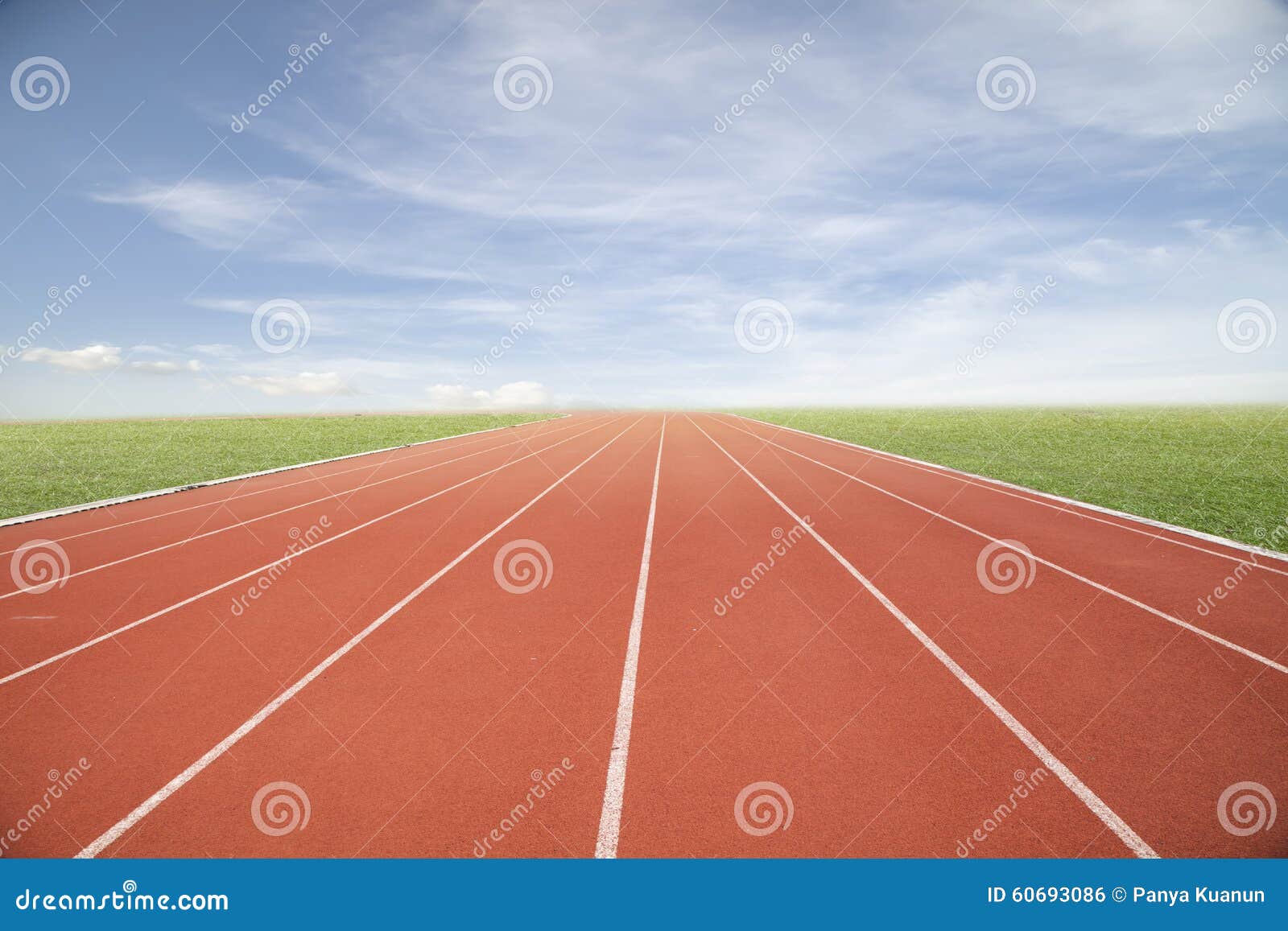 Running Track with Green Grass and Blue Sky White Cloud. Stock Photo ...