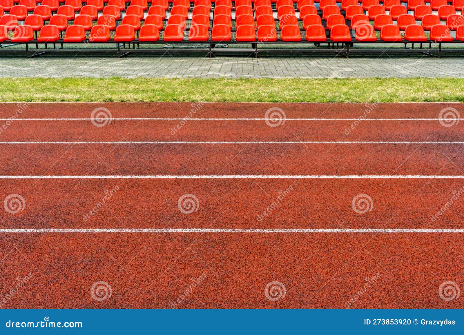Running Track and Red Plastic Chairs on a Sports Stadium Stock Photo ...