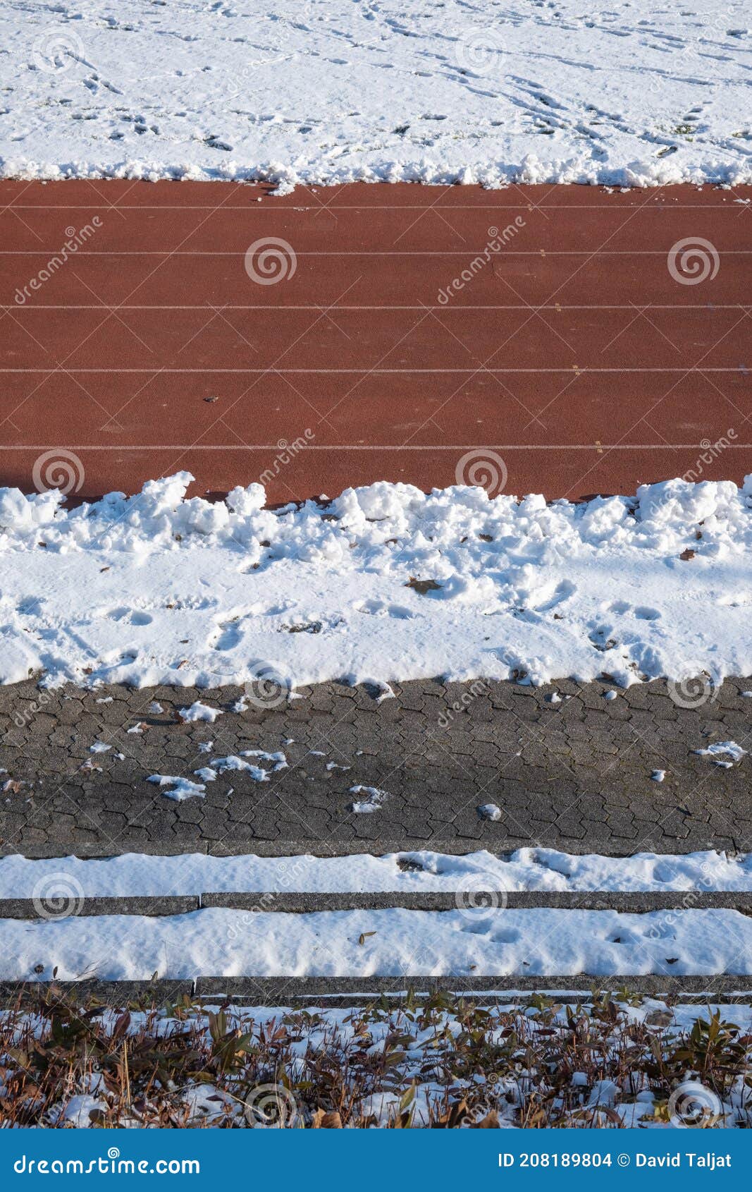 The Running Track of a Stadium in Winter Stock Photo - Image of snow ...