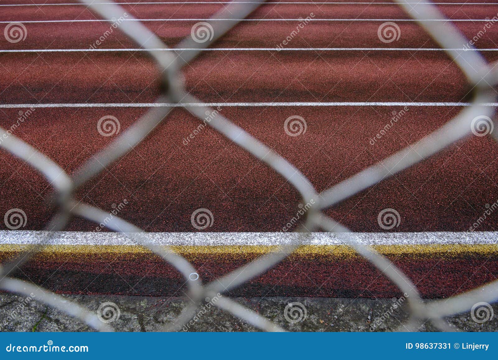 Running Track through Wire Fence Stock Image - Image of link, fence ...