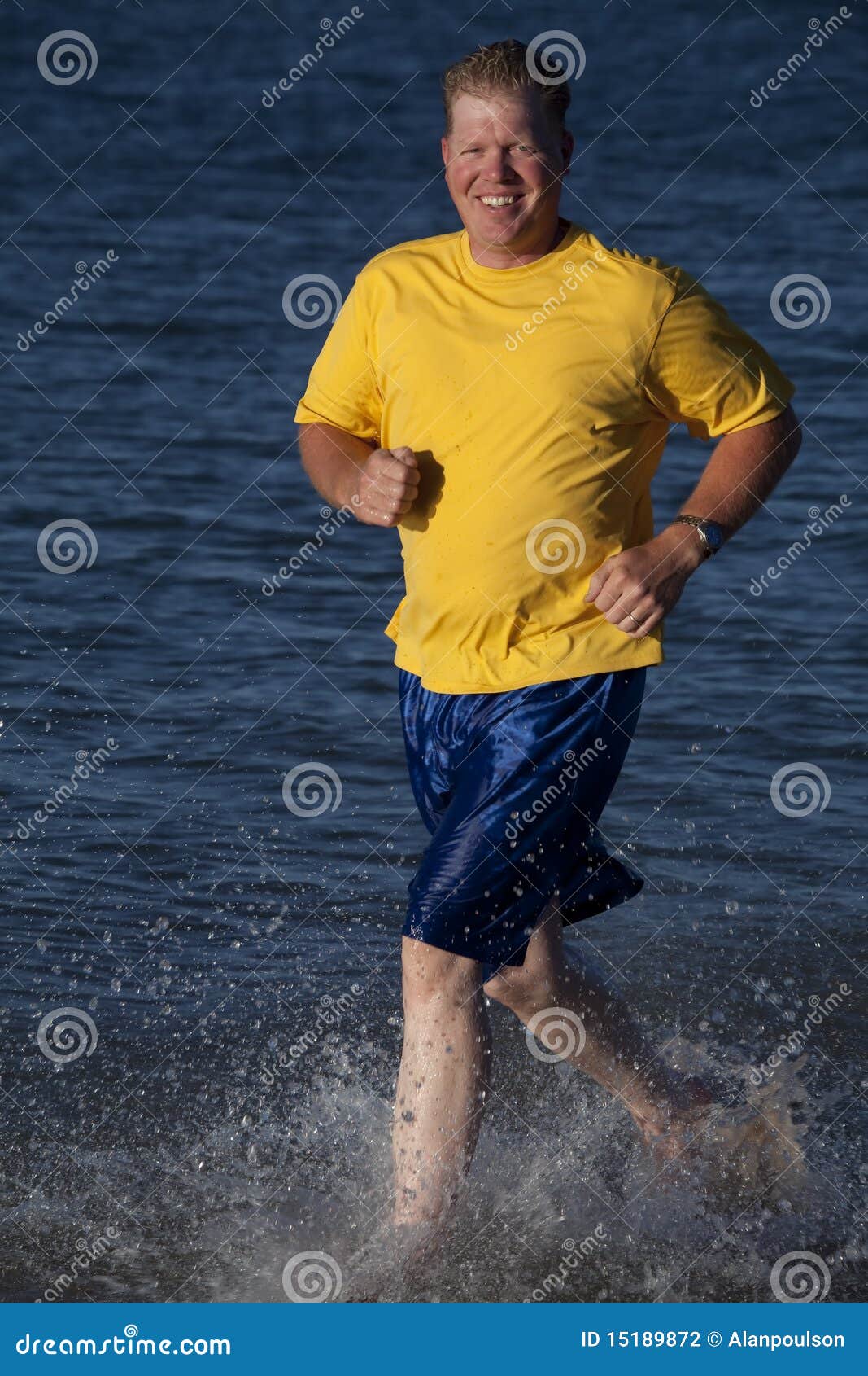 Running in water stock photo. Image of practice, male - 15189872