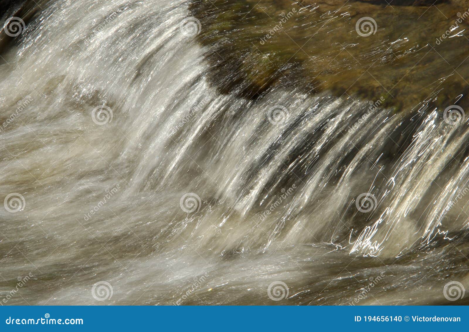 Running water over rocks stock photo. Image of texture - 194656140