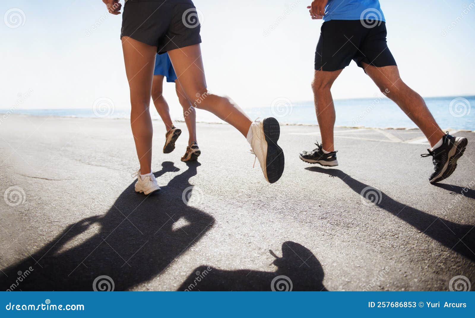 Running is a Way of Life. Low Angle View of a Runner Next To the Ocean ...