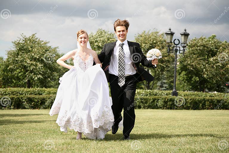 Running wedding couple stock image. Image of beauty, face - 2896005