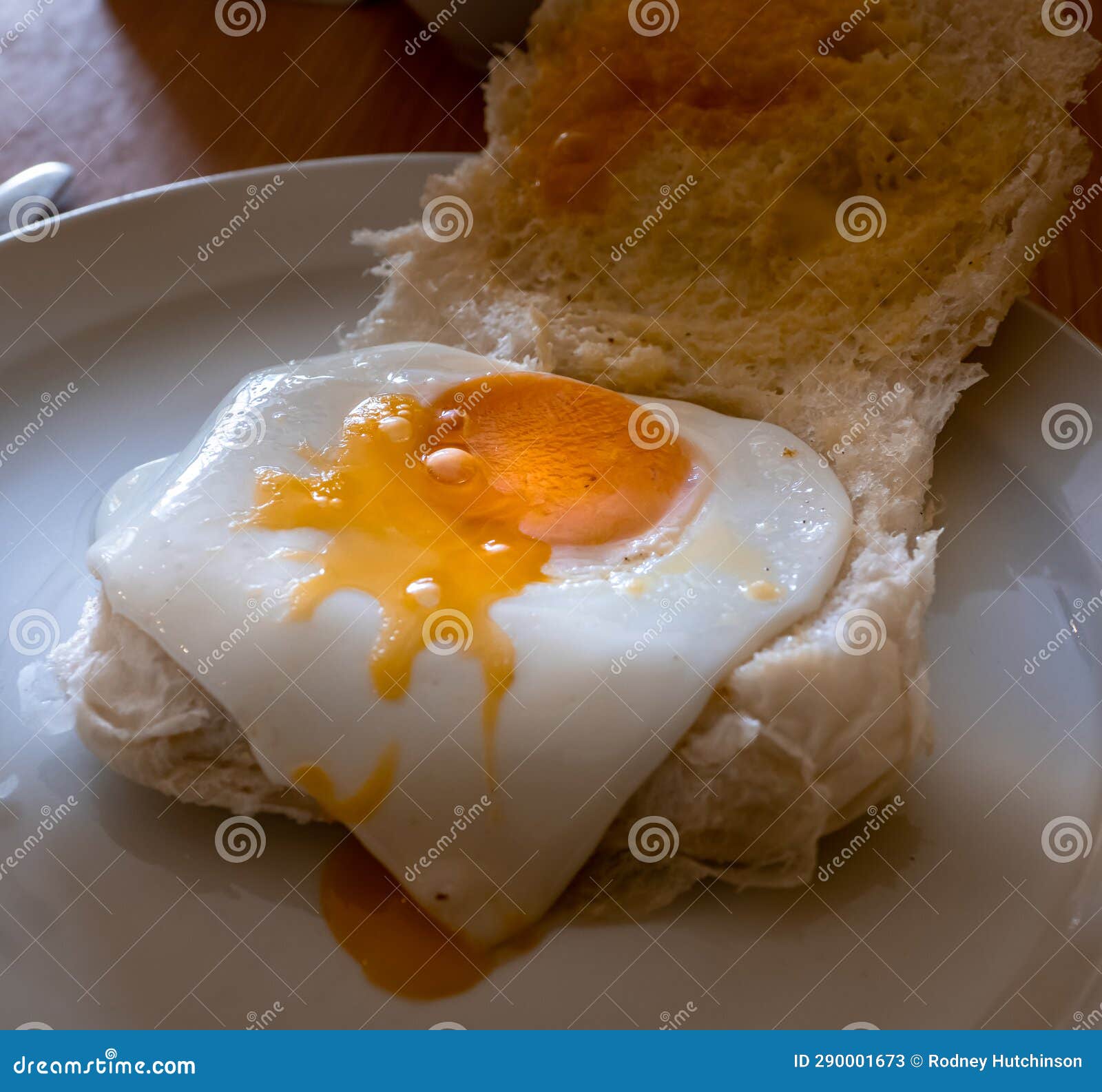 Runny yoke fried egg roll stock image. Image of torte - 290001673