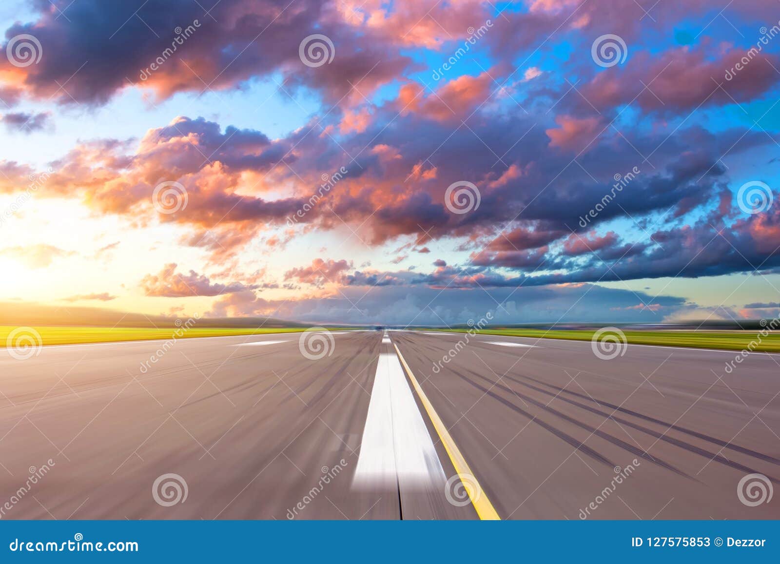 Runway at the Airport in the Evening Sunset Sun Light Bright Red Clouds ...