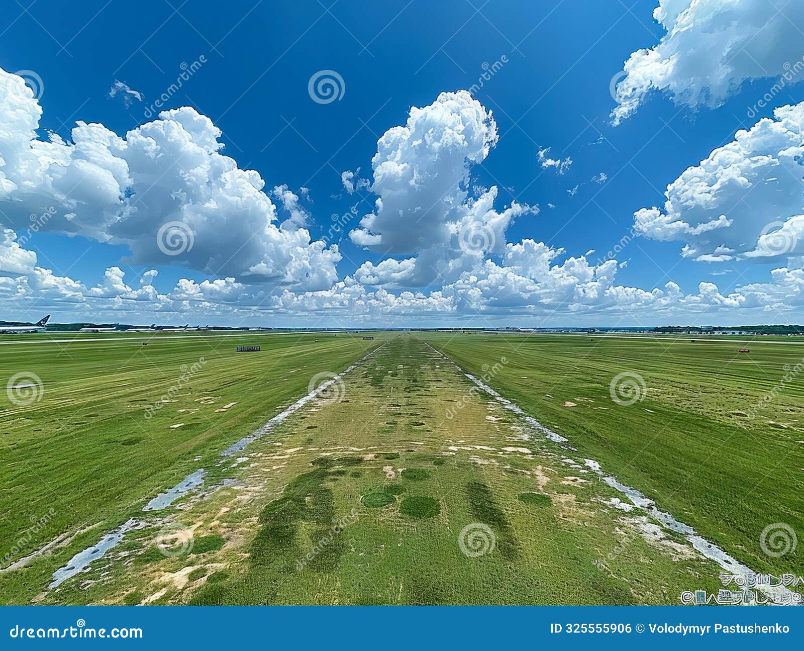 A Runway with Clouds in the Sky Stock Photo - Image of grassy, raceway ...