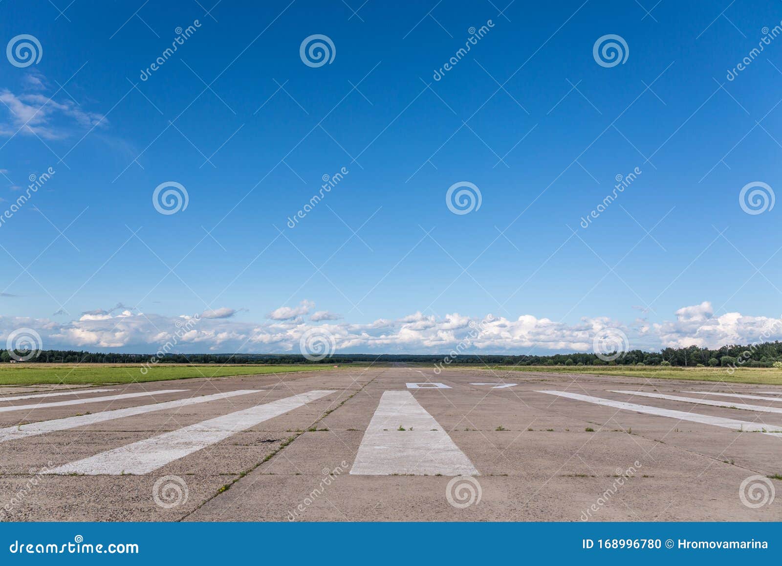 The Runway of a Rural Small Airfield Against a Blue Sky Stock Photo ...