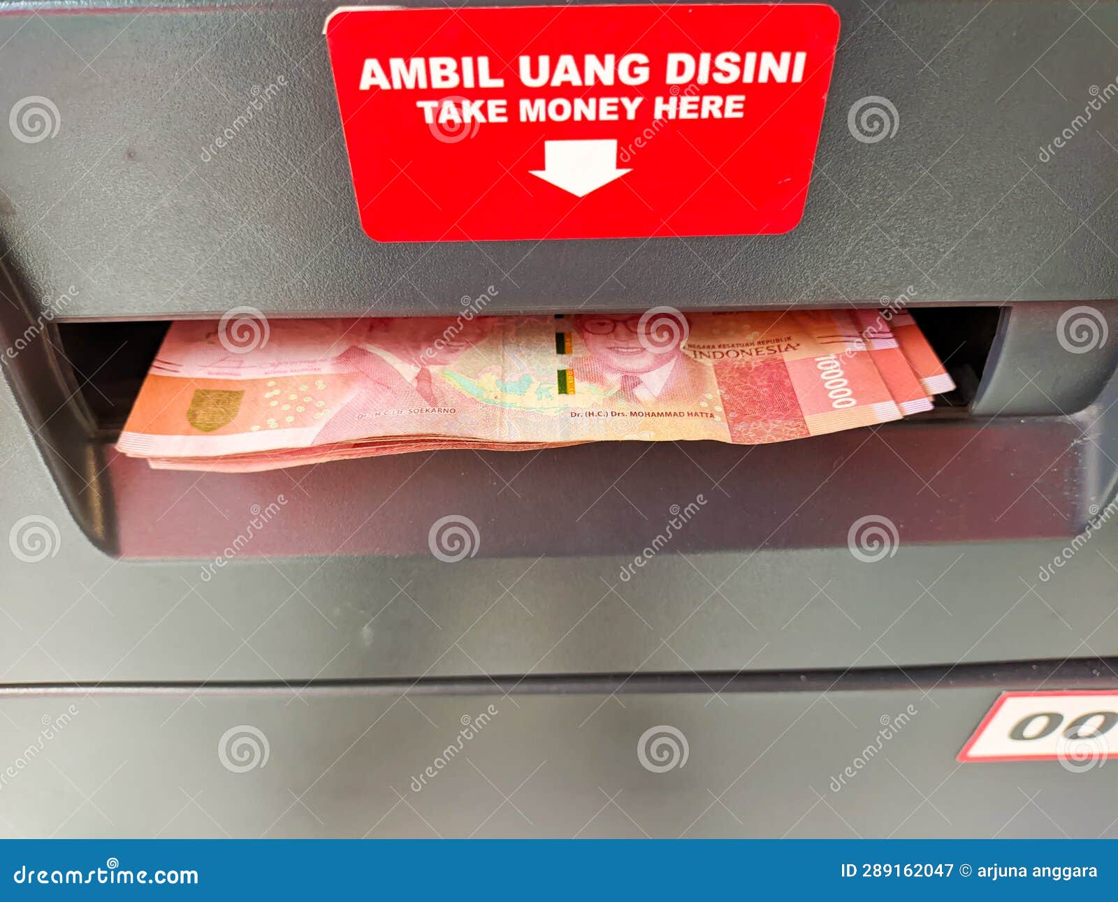 Rupiah Money Comes Out of the ATM Machine Stock Image - Image of ...