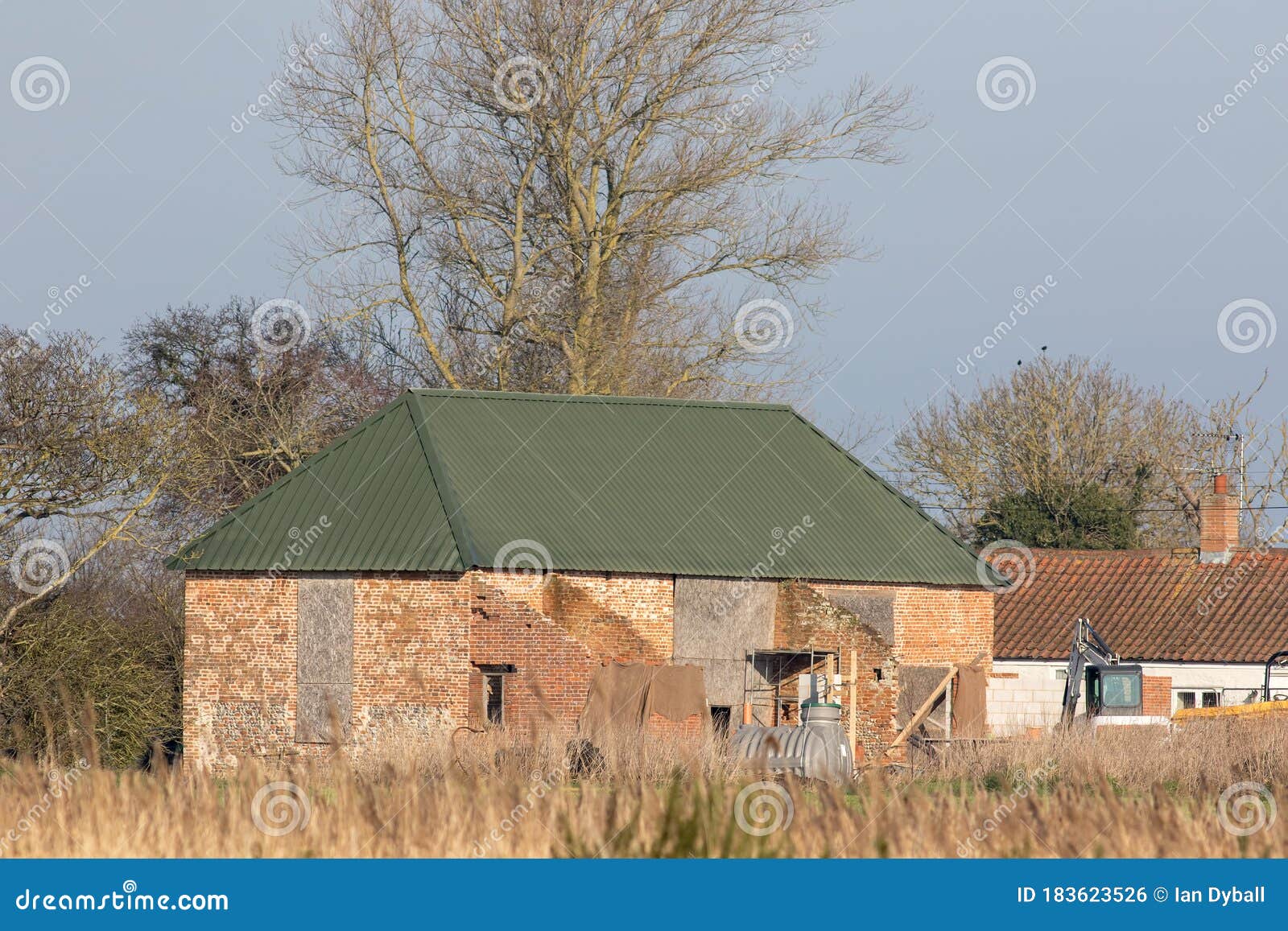 Barn Conversion. Old Dilapidated Brick Farm Building Covered In ...