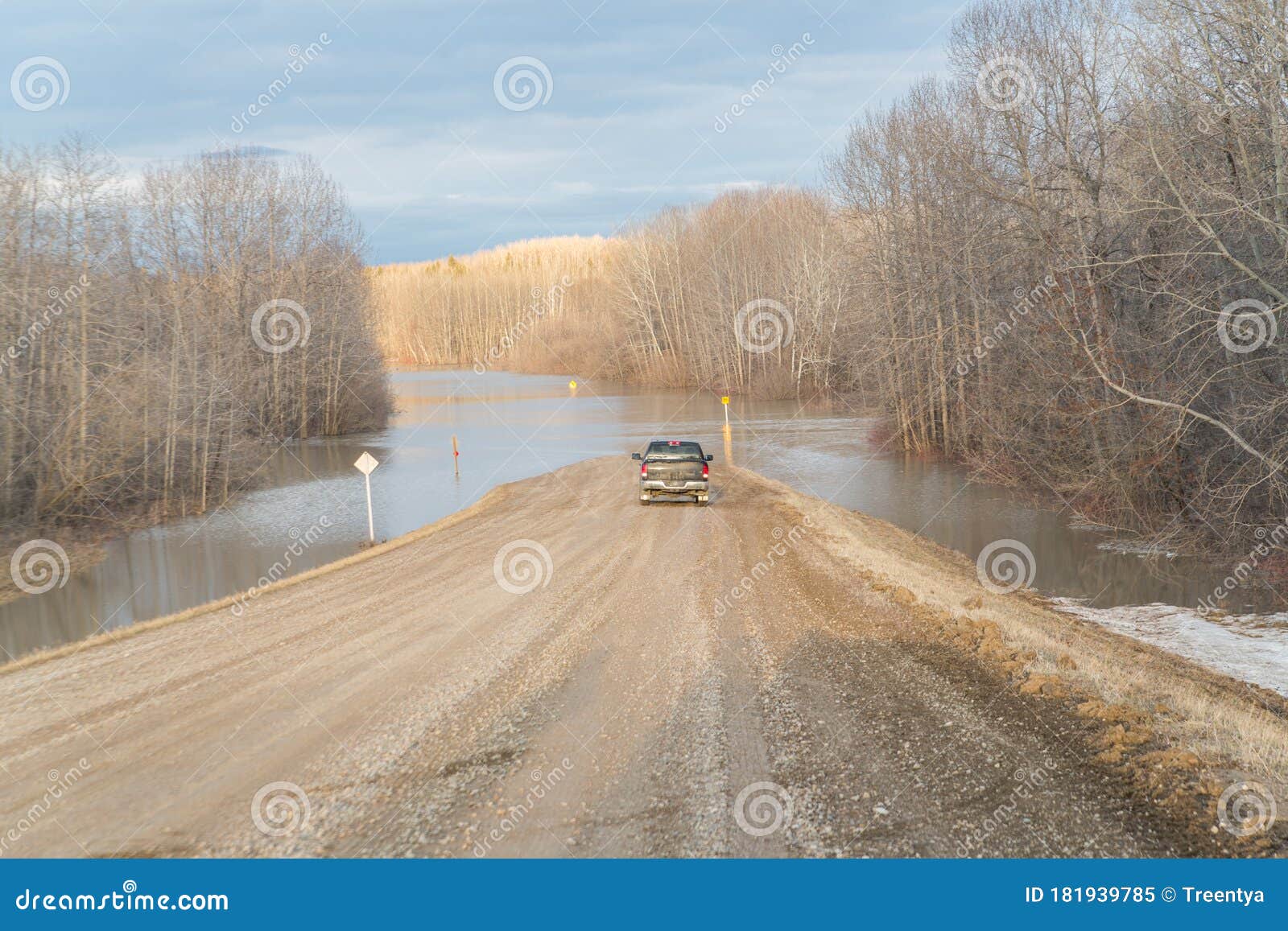 A Rural Dirt Road Flooded with Water Stock Image - Image of natural ...