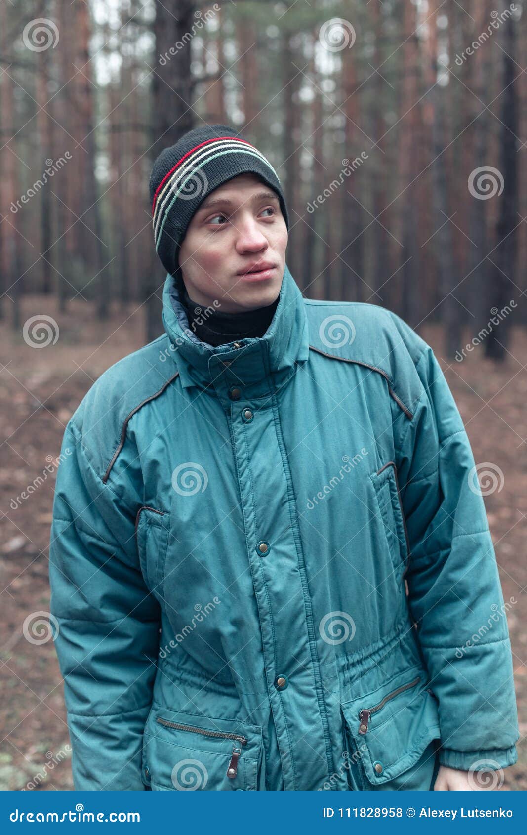 A Rural Guy Posing in a Pine Forest in the Autumn Time. Stock Photo ...